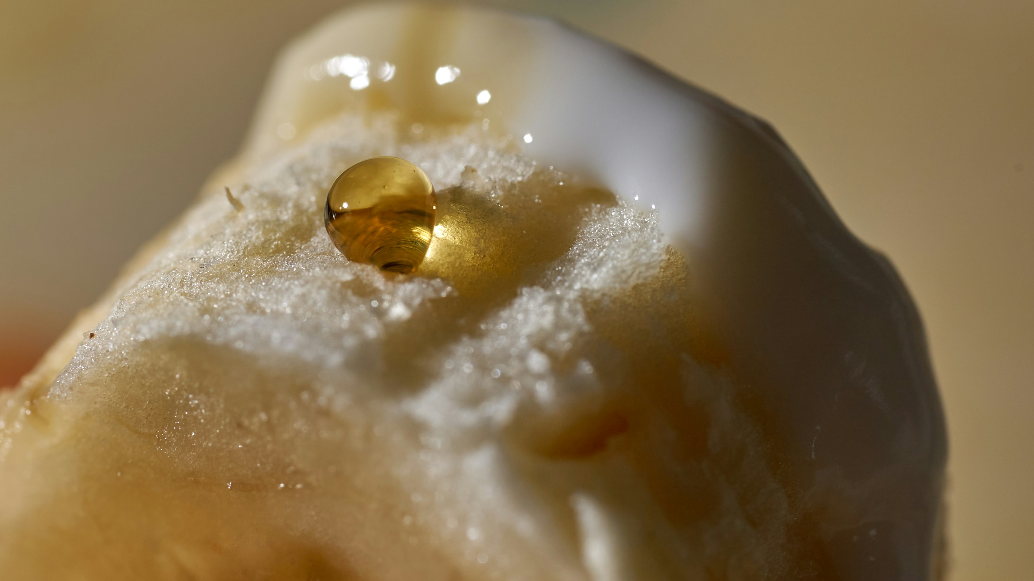 Golden Drop on White Microcosm