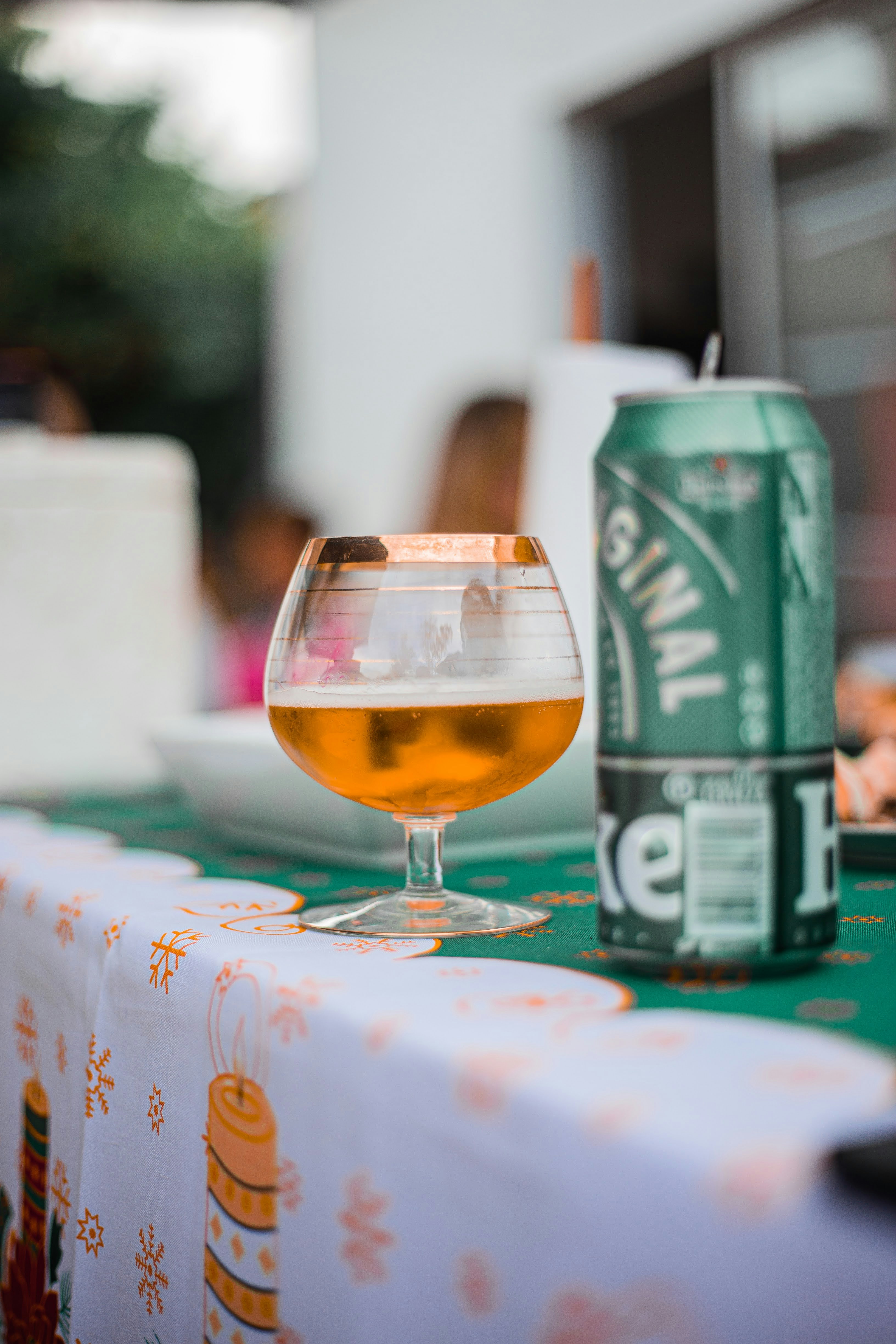 Glassy Glow: A Golden Pour in a Summer Gathering
