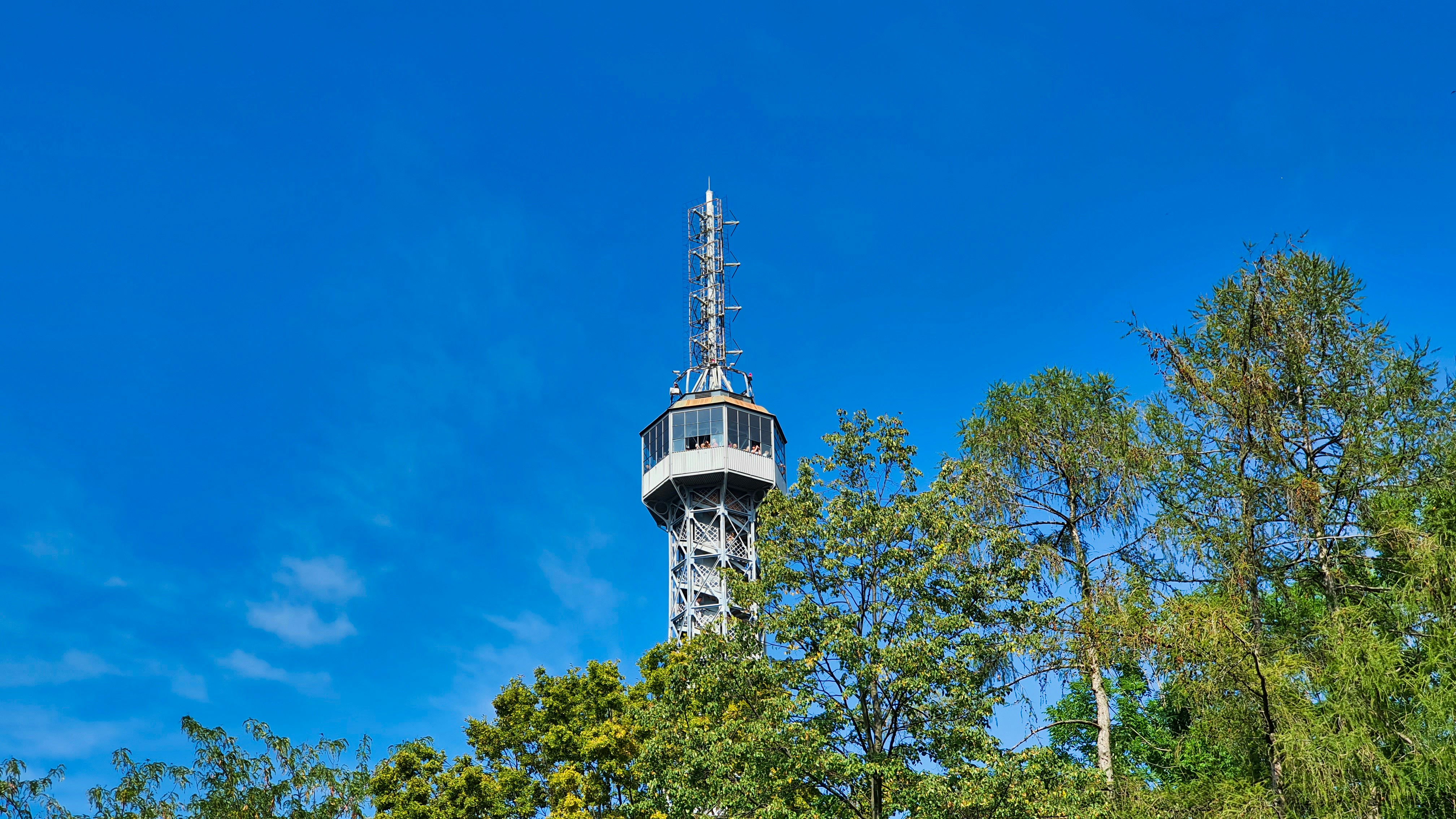 A Towering Spire Piercing a Clear Blue Sky