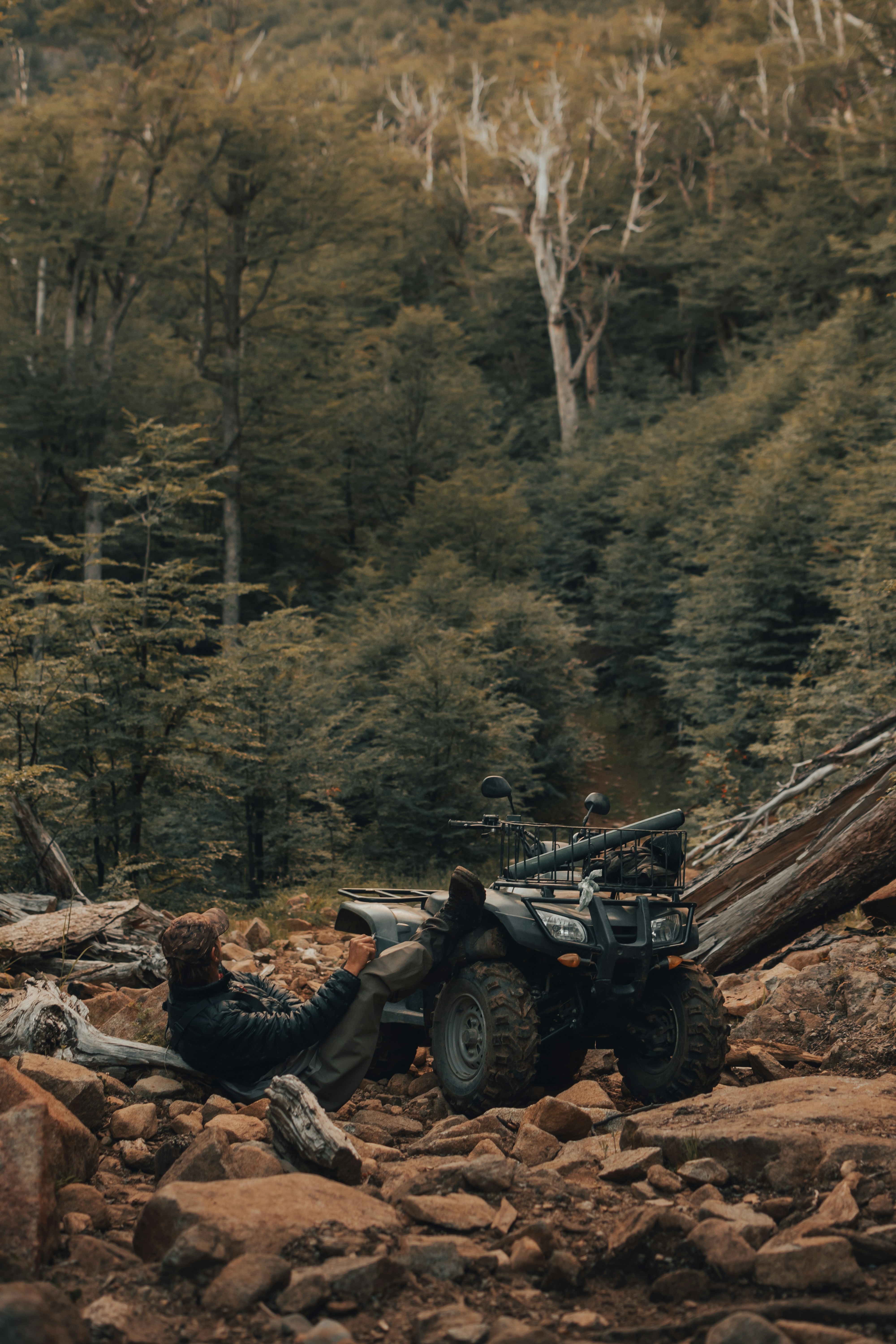 Black and gray atv on brown wood log photo – Free Grey Image on Unsplash