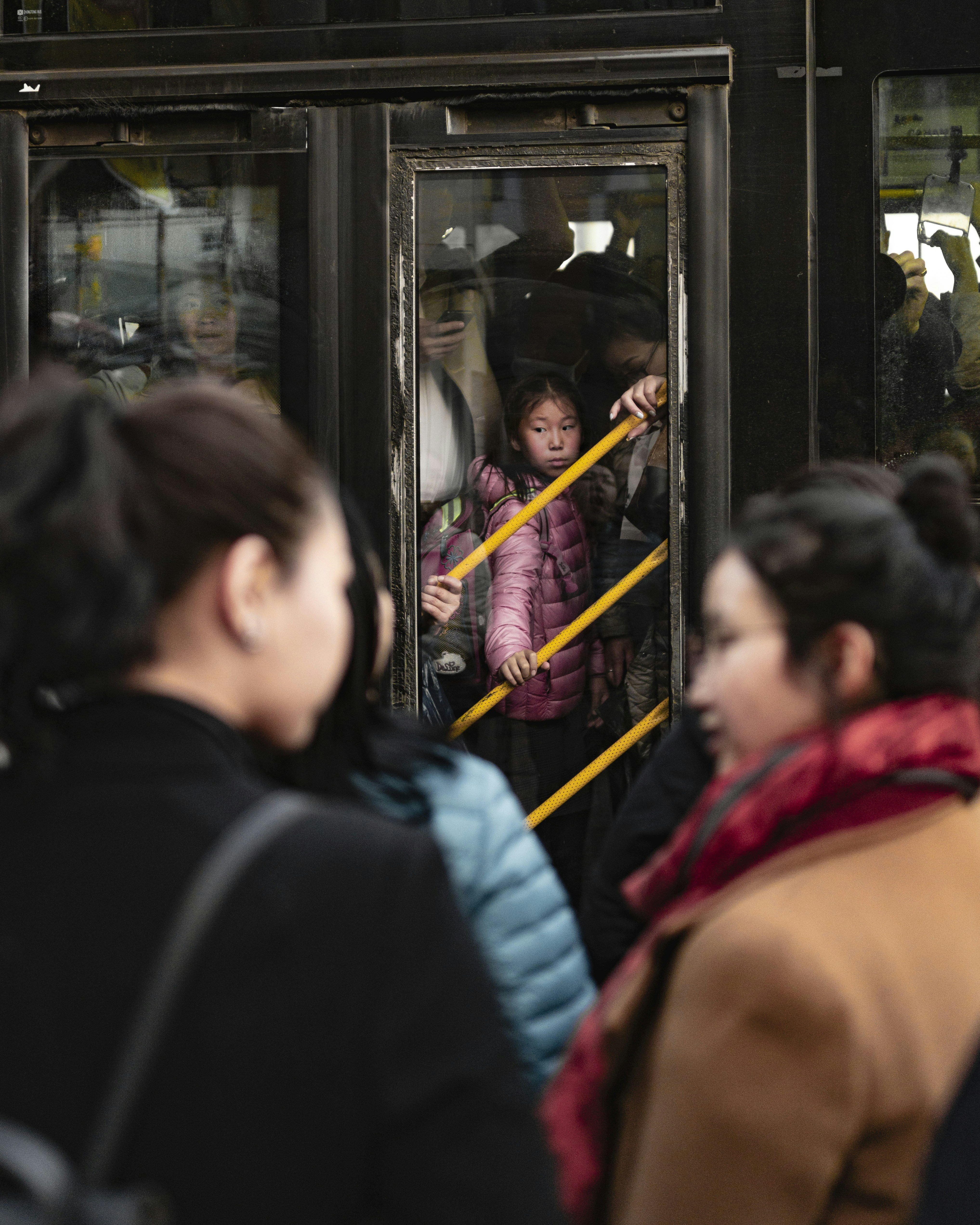 people in train during daytime