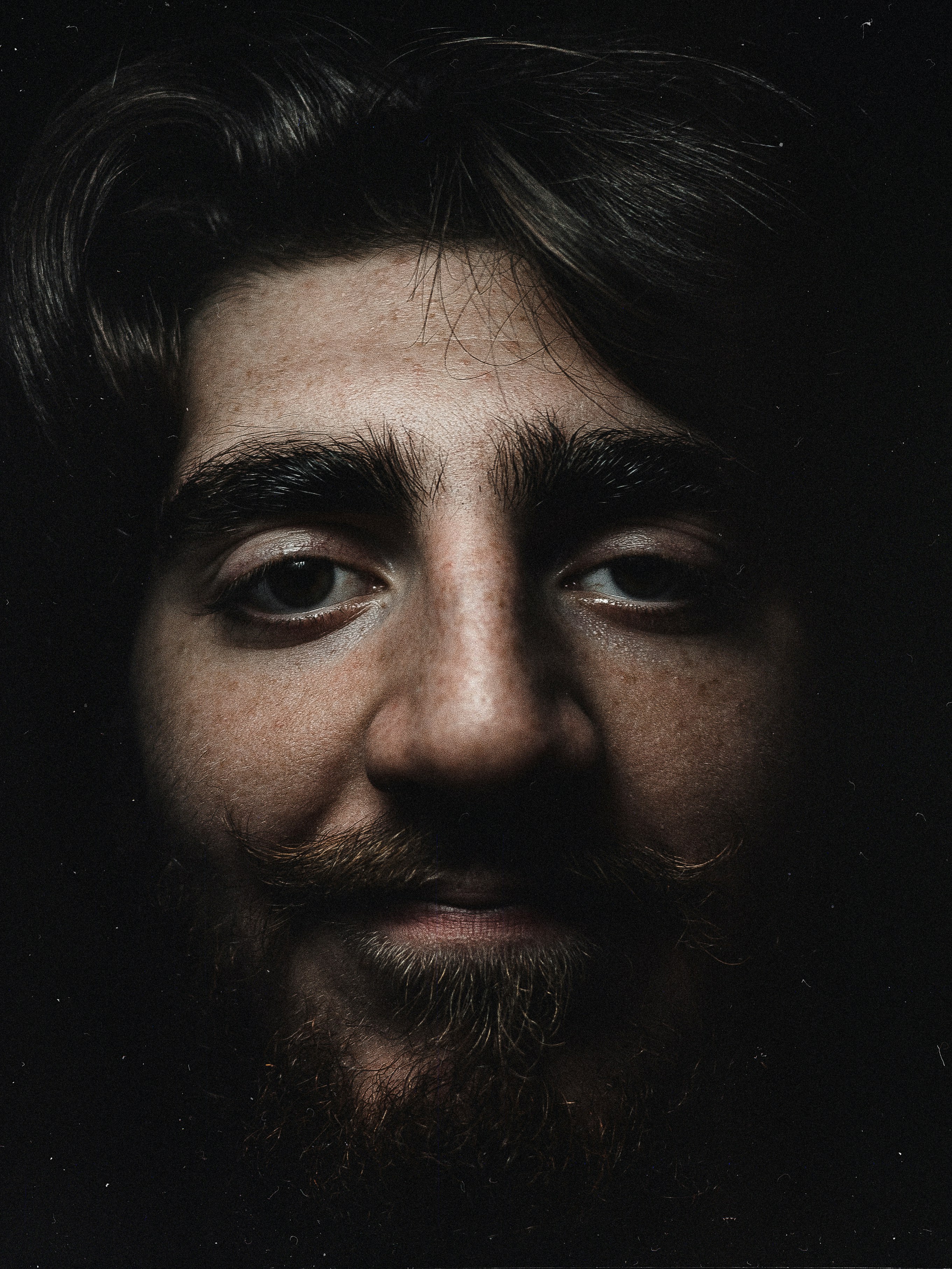 Mans face in black background photo – Free Black Image on Unsplash