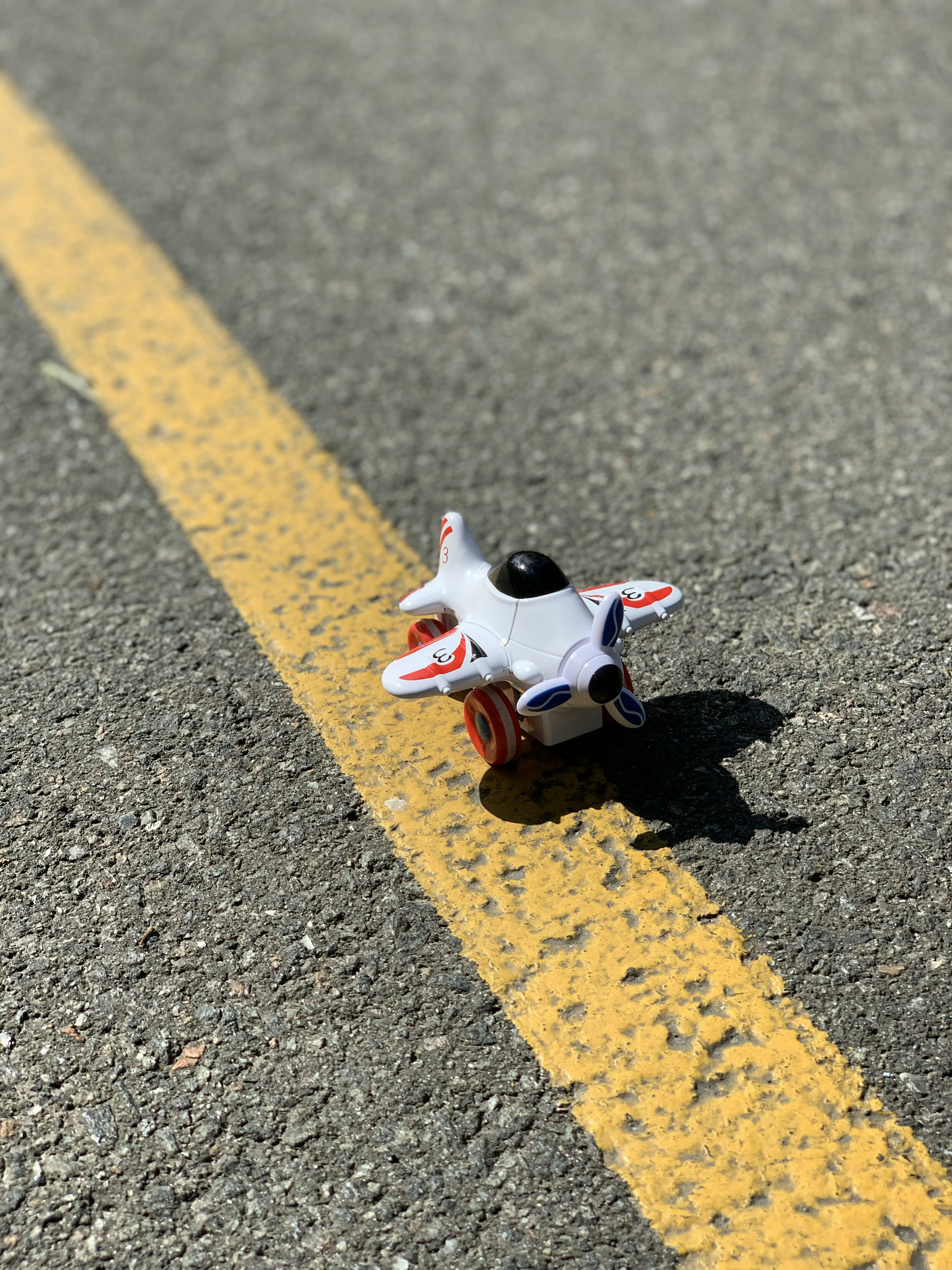Miniature Jet Racer on a Sunny Yellow Line