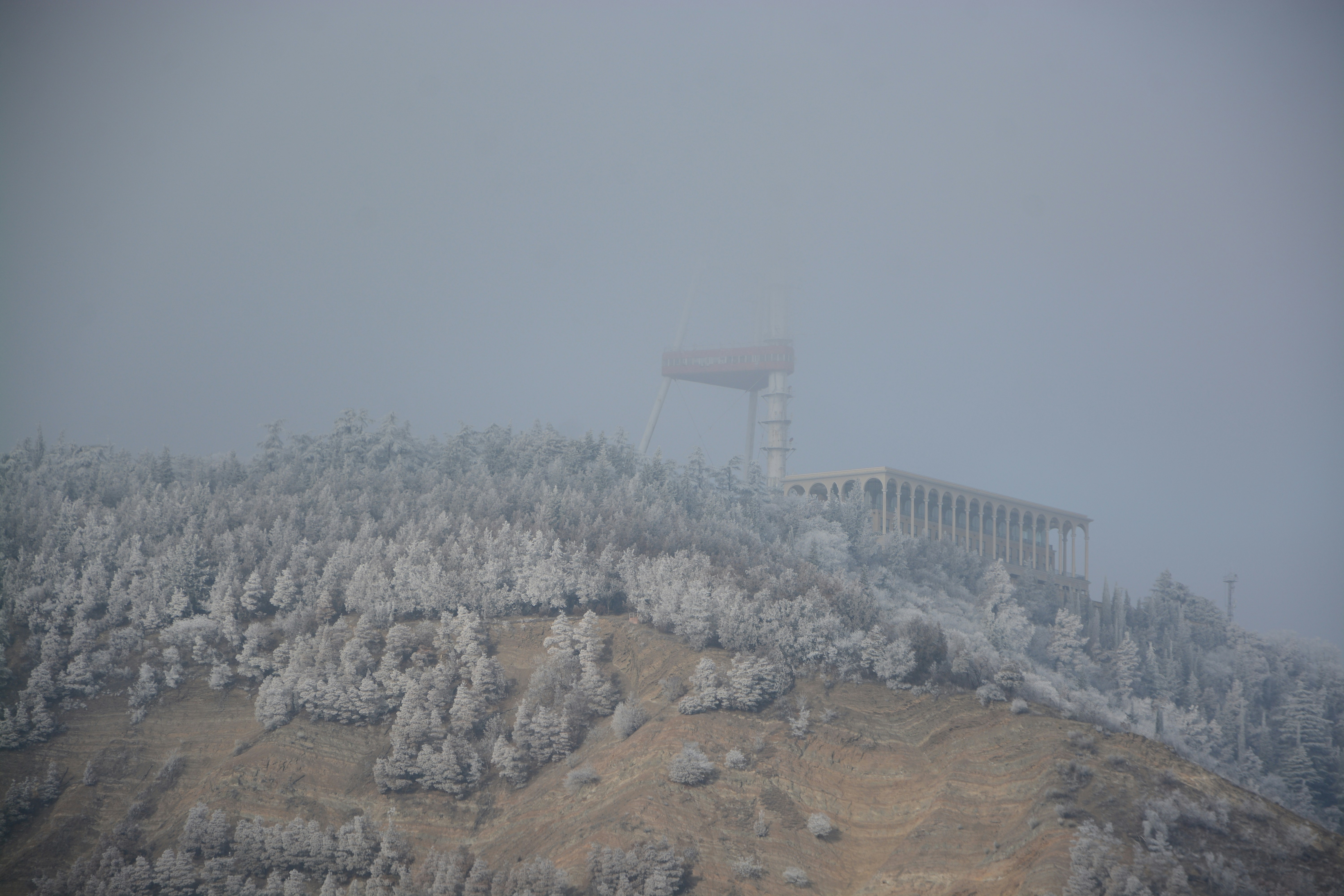 Mist-Wrapped Summit Observatory