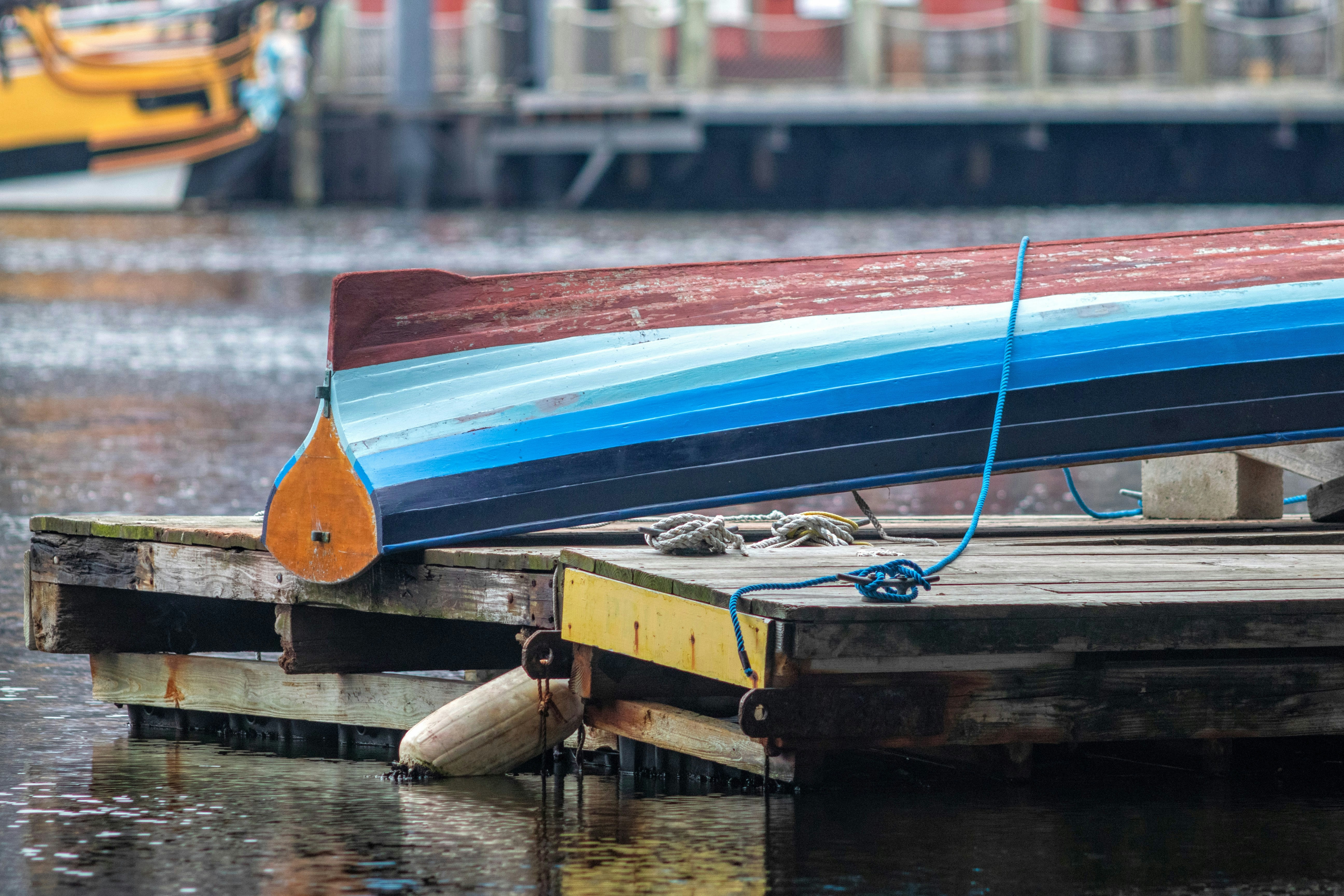 Serenity at the Dock: A Colorful Canoe's Rest