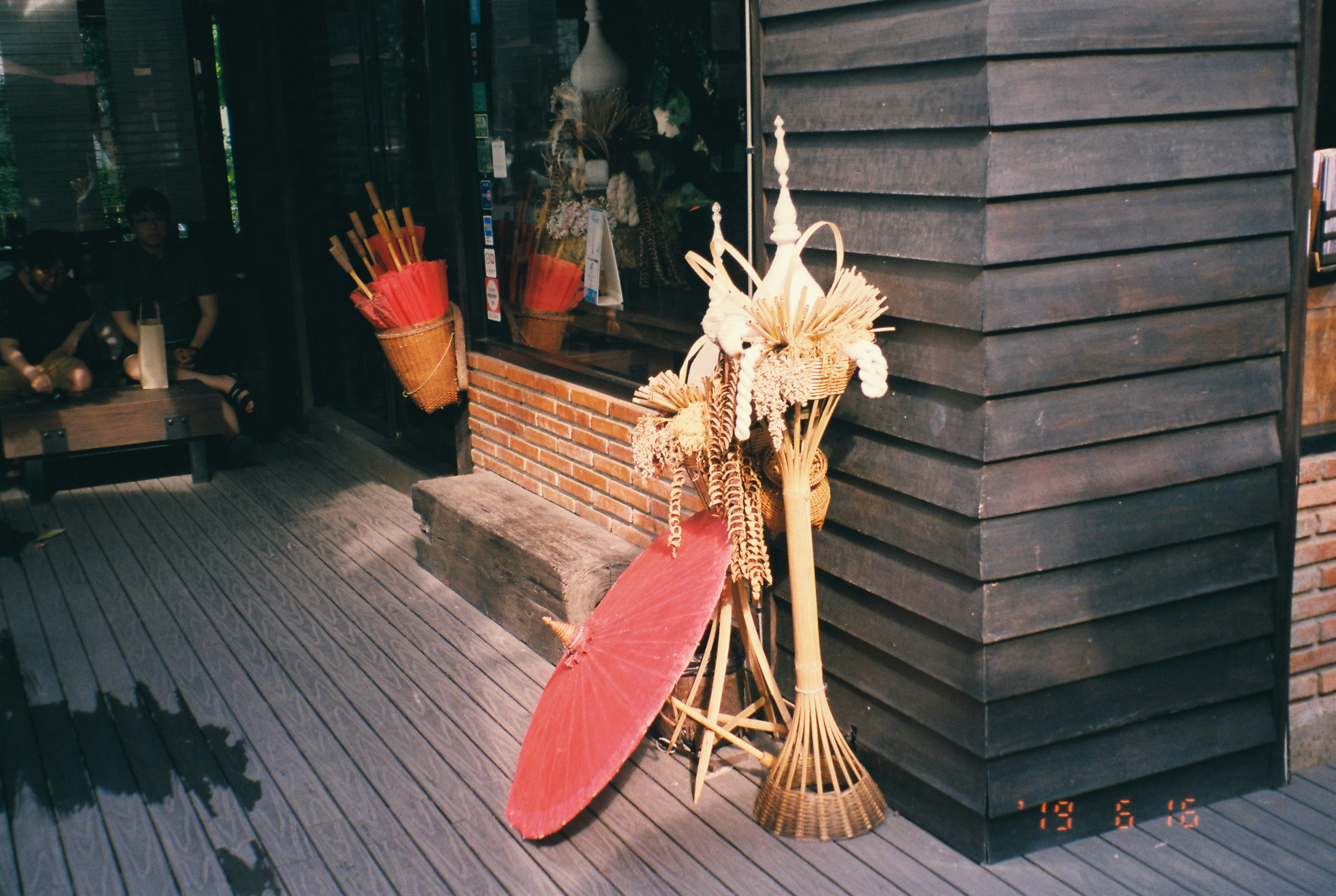 white and red umbrella on brown wooden table