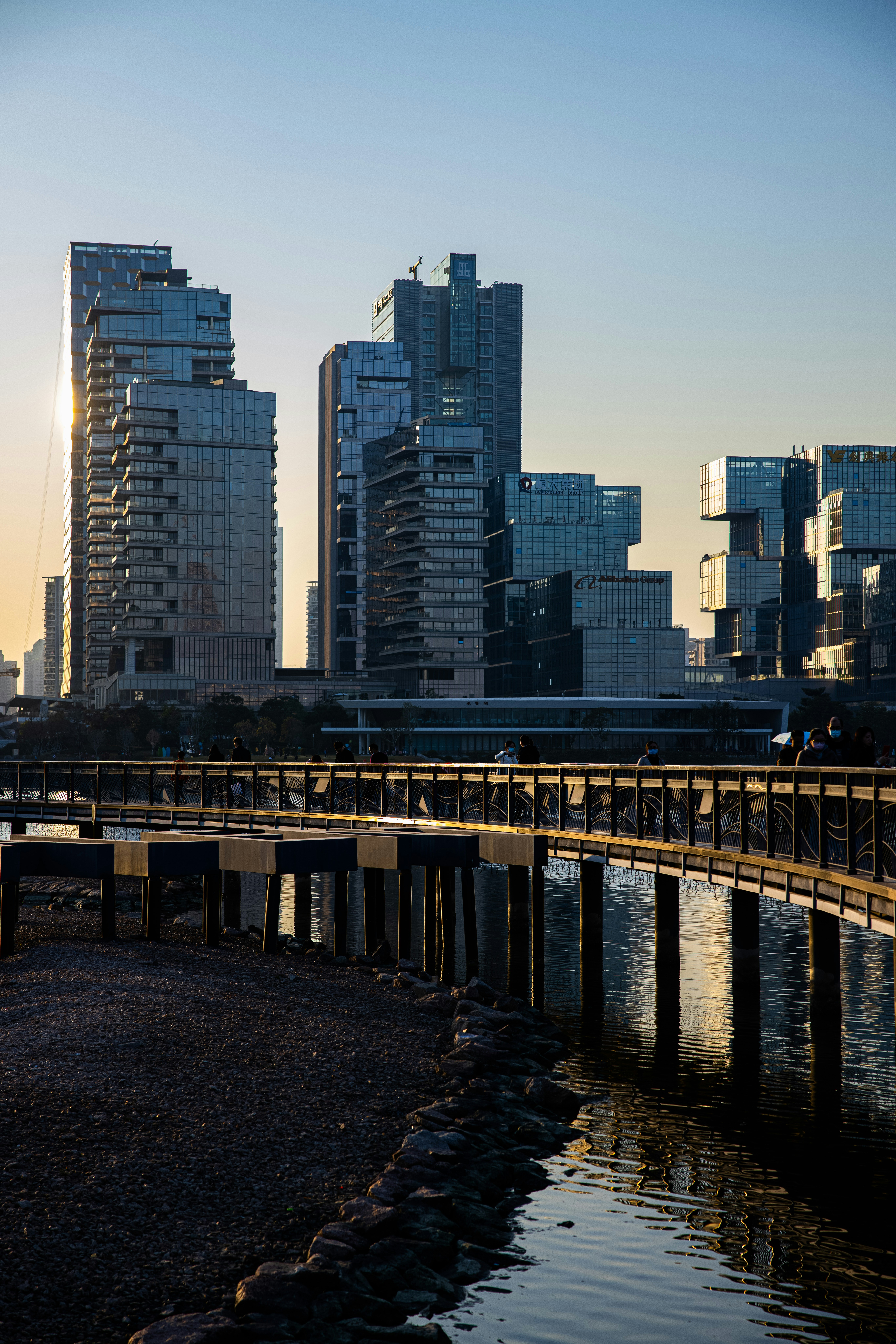 Gray concrete bridge over body of water during daytime photo – Free ...
