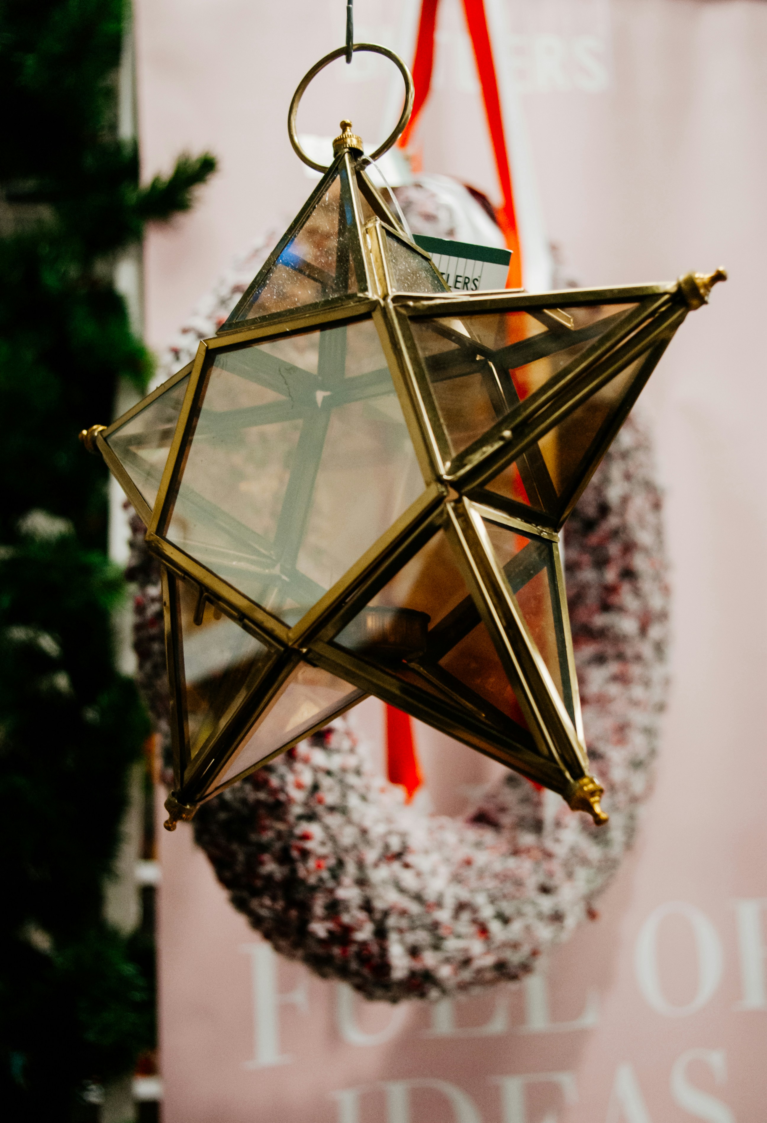 Brass Geodesic Star Lantern in a Soft Holiday Backdrop