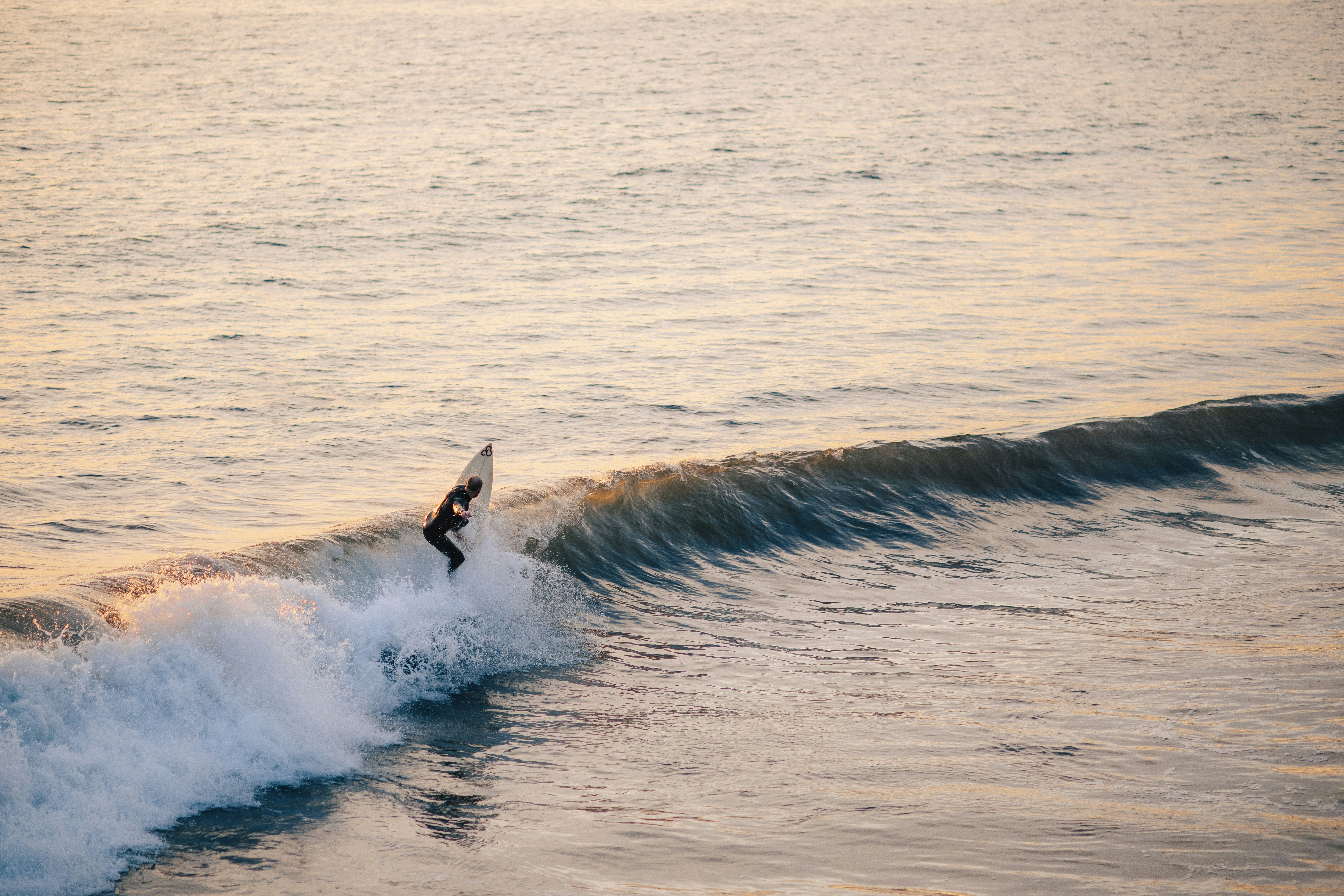 Person surfing on sea waves during daytime photo – Free Seal beach ...
