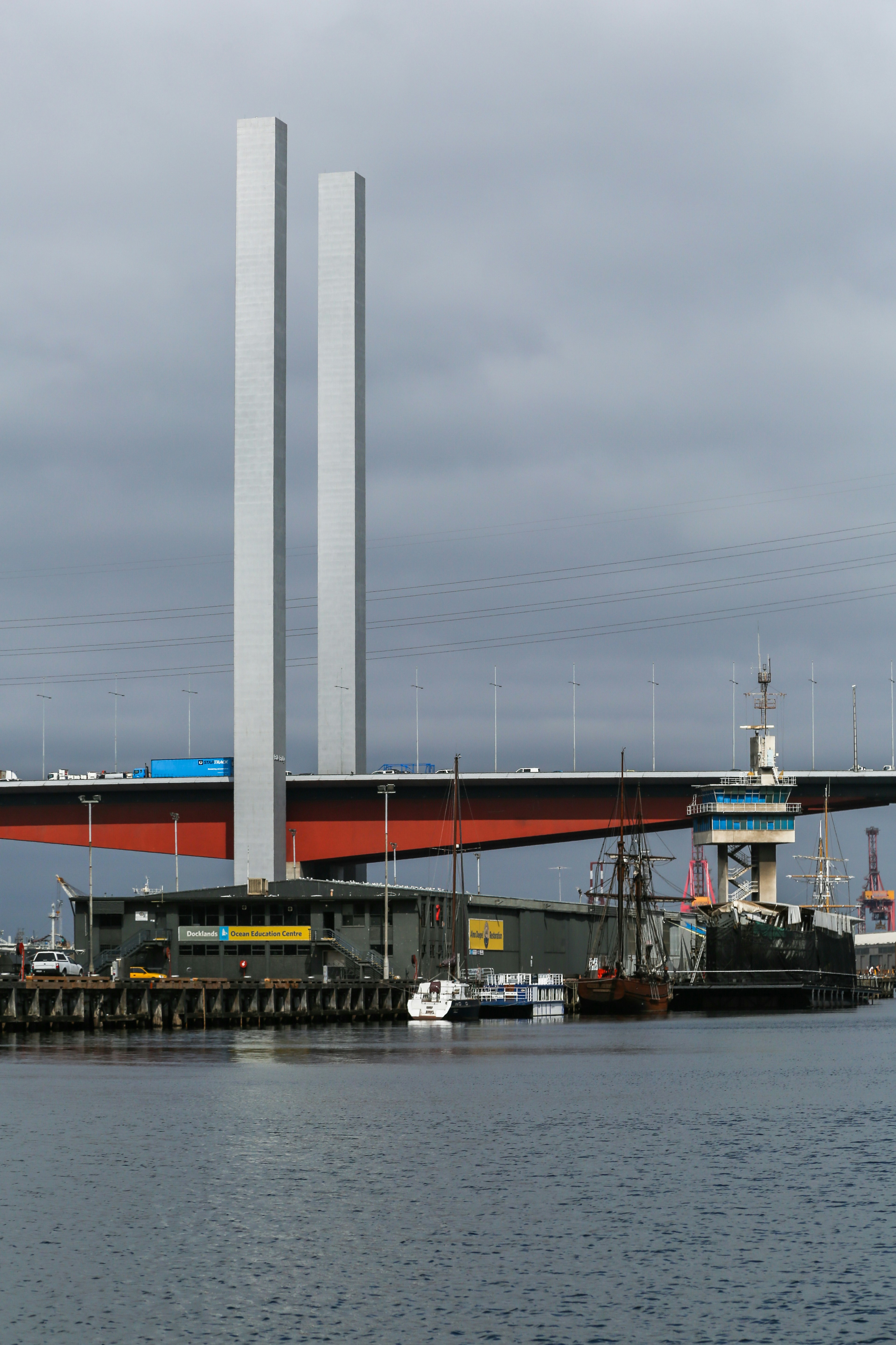 Twin Towers Over the Wharf: A Harbor Bridge Scene