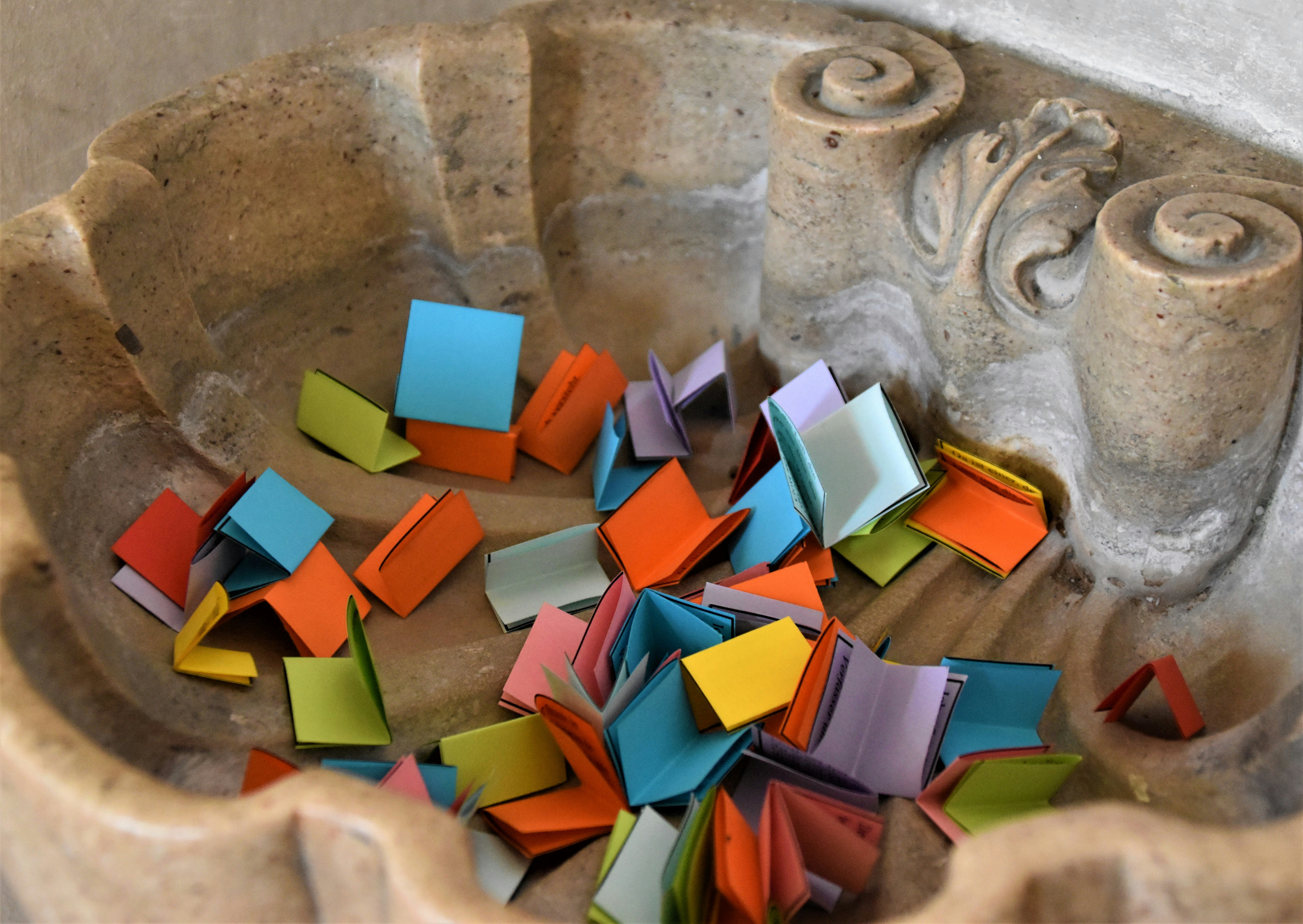 Palette of Folded Paper in a Weathered Stone Bowl