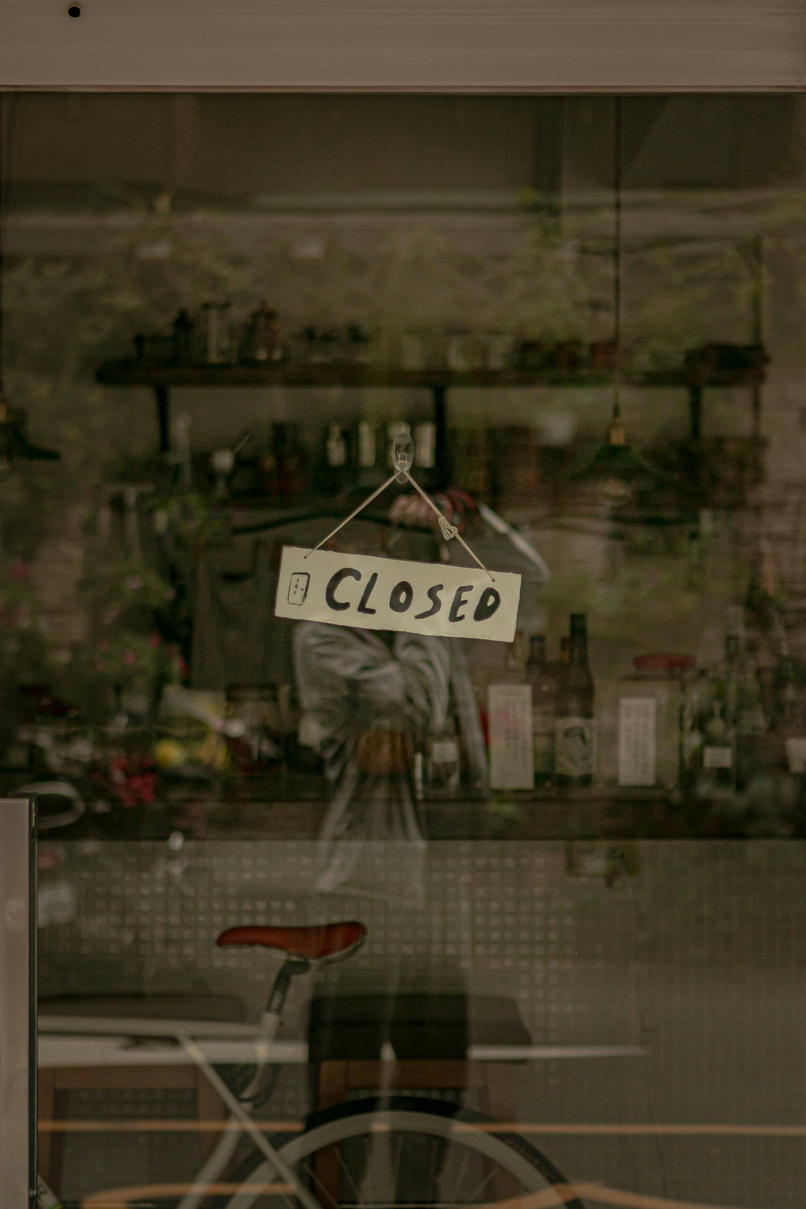 Closed Sign, Open Reflections: A Window into a Hidden Café