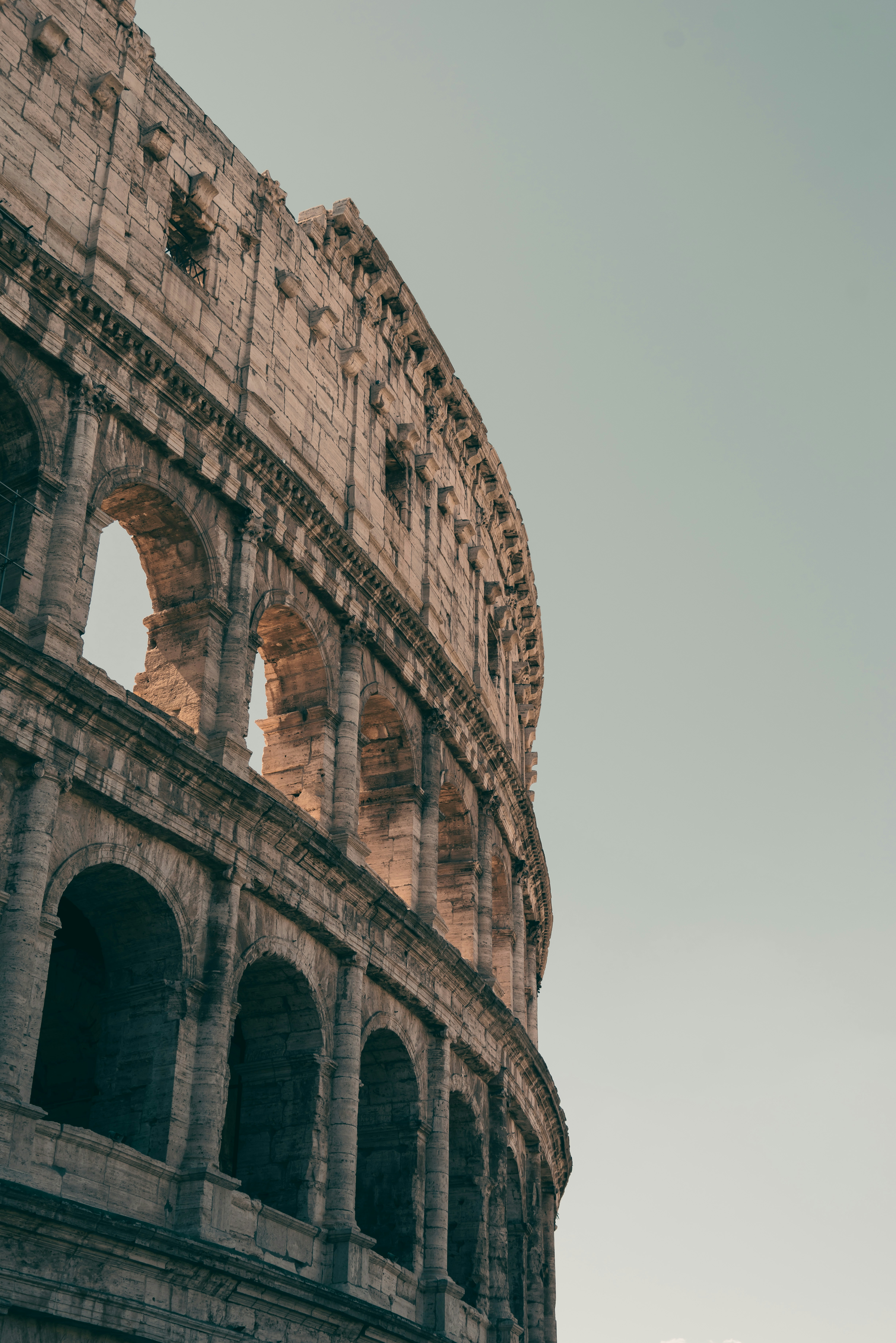 Ancient Arches Against a Pale Sky