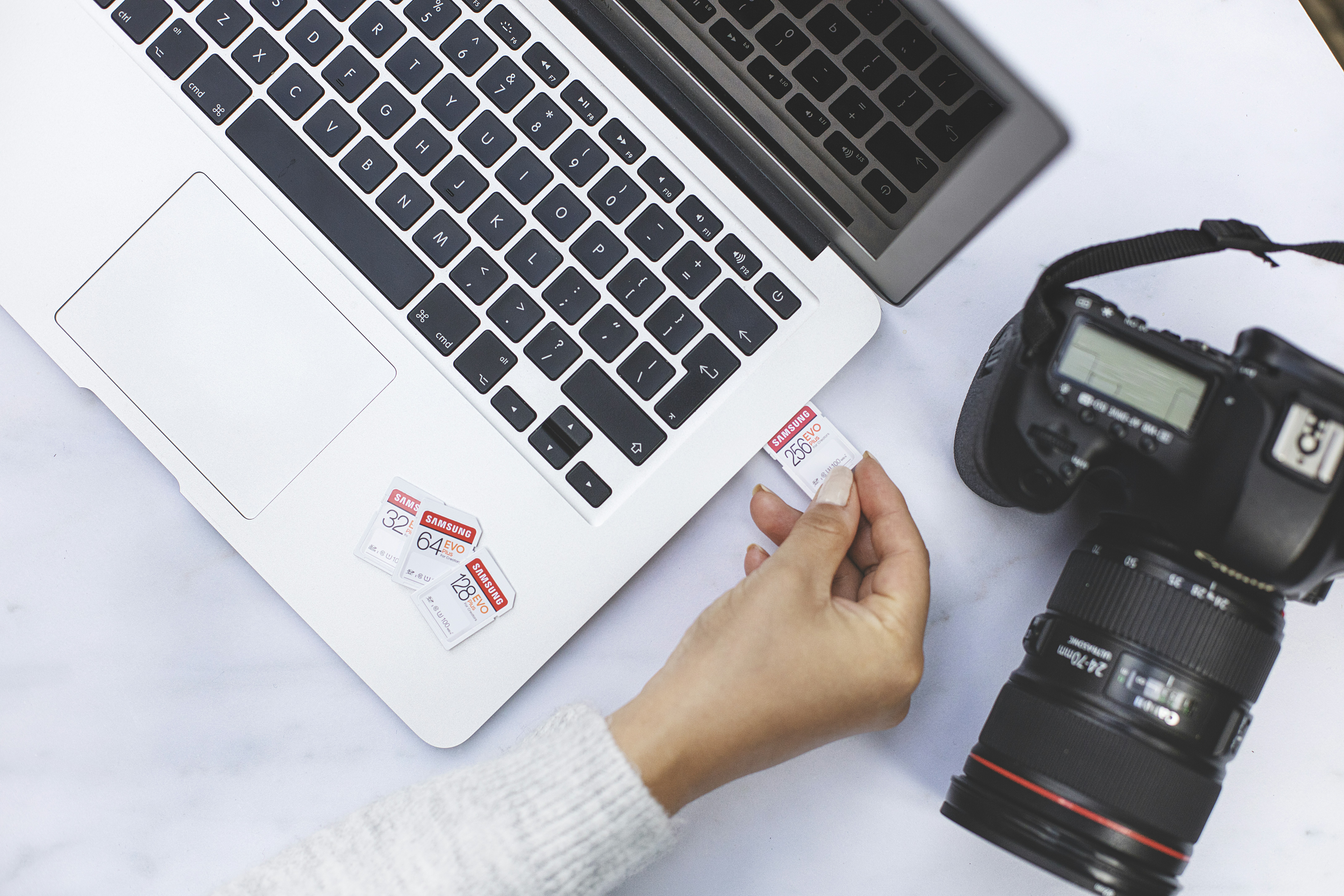 Person holding black and silver laptop computer photo – Free Human ...