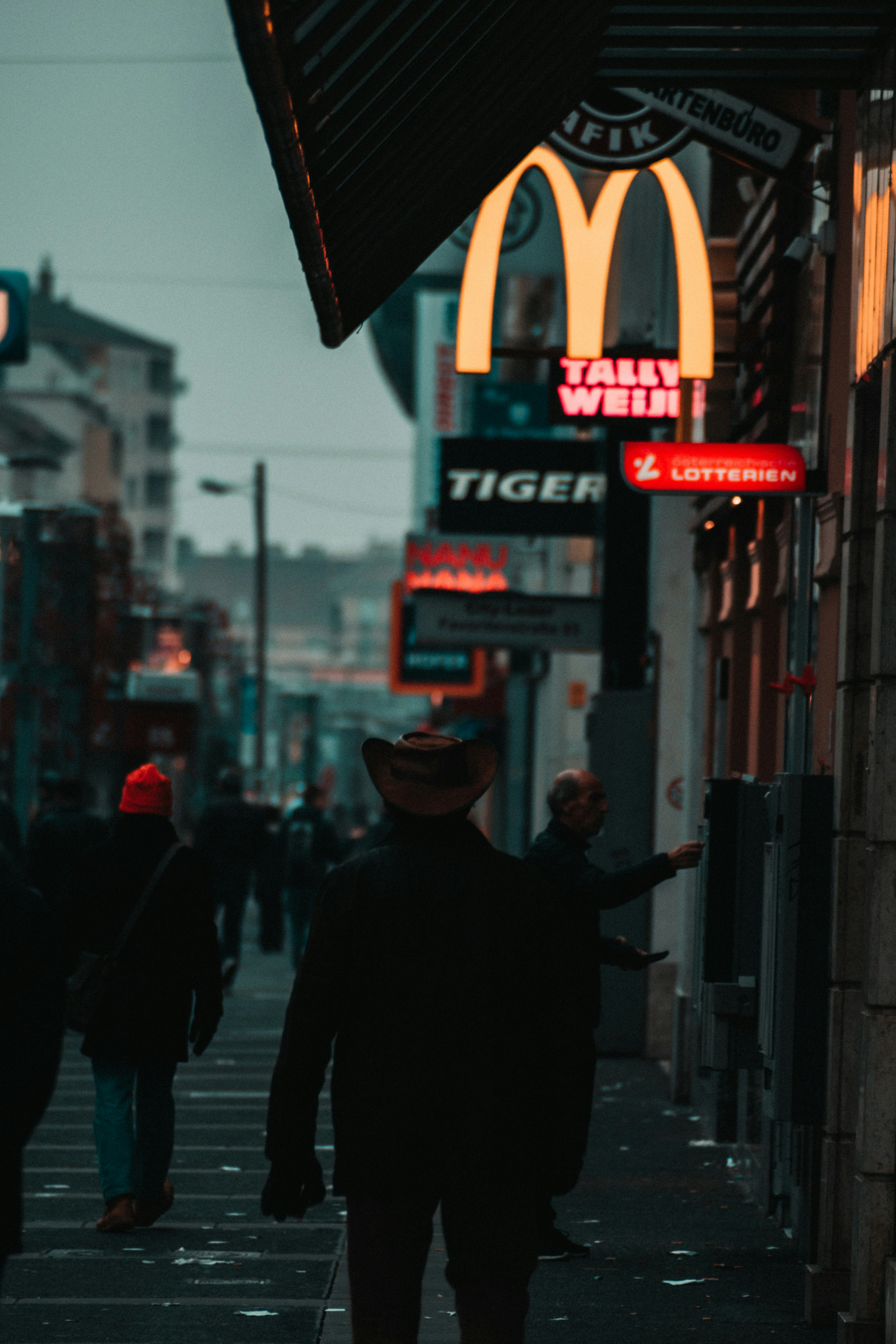 Neon Crossing: A Downtown Evening at the McD Corner