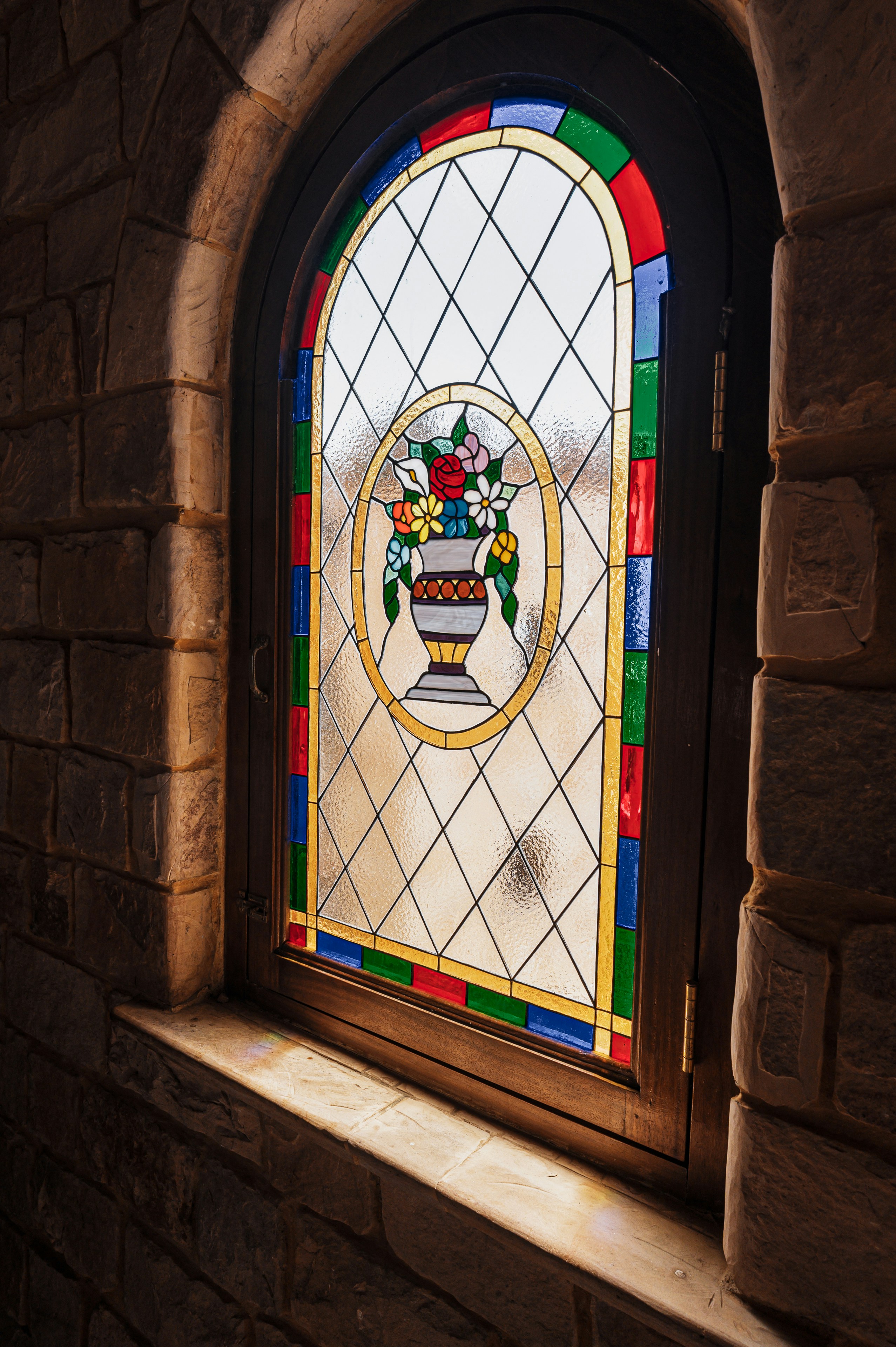 Red blue and yellow glass window photo – Free Art Image on Unsplash