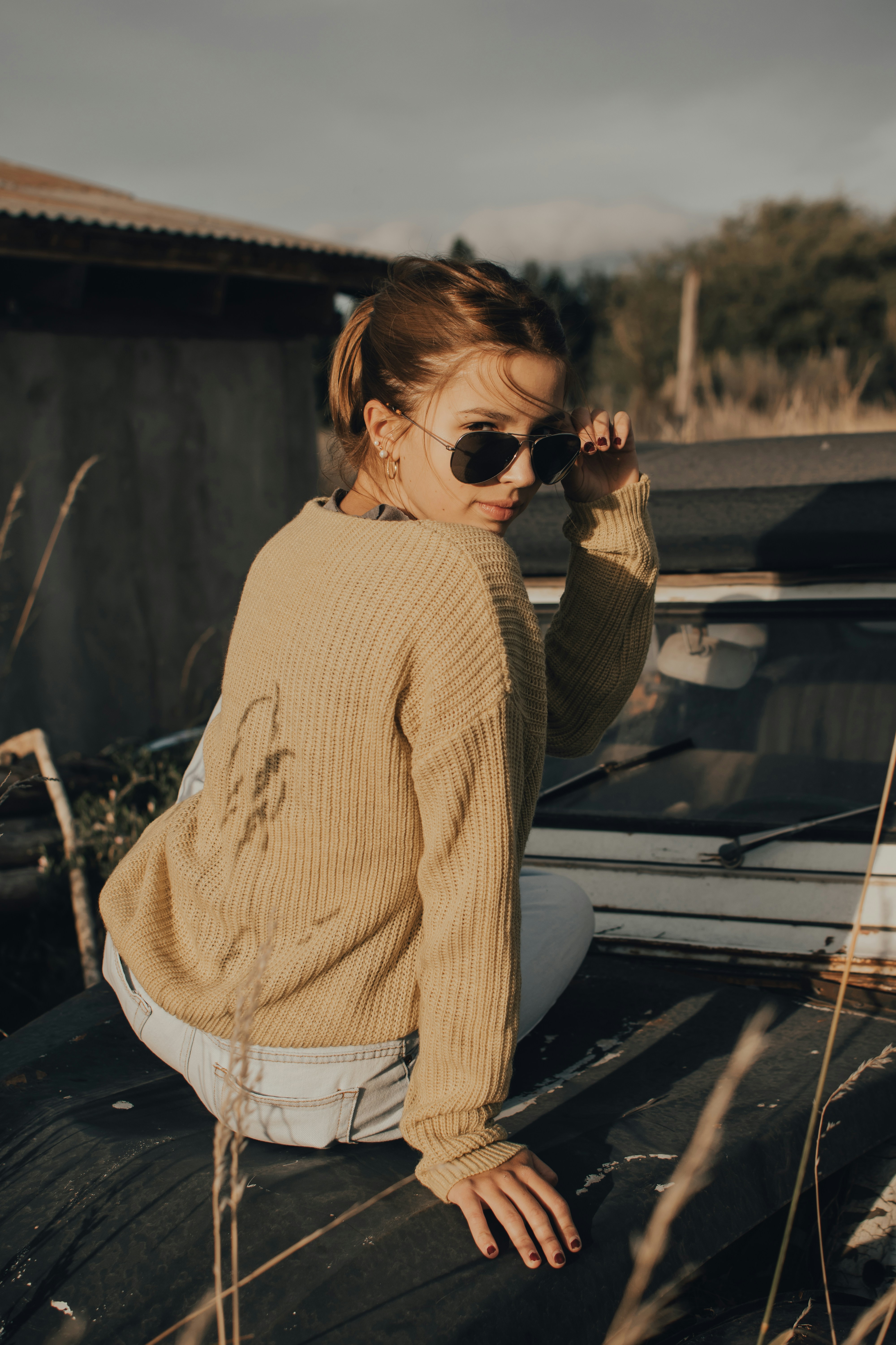 Golden Hour Confidence: Portrait on a Weathered Pickup