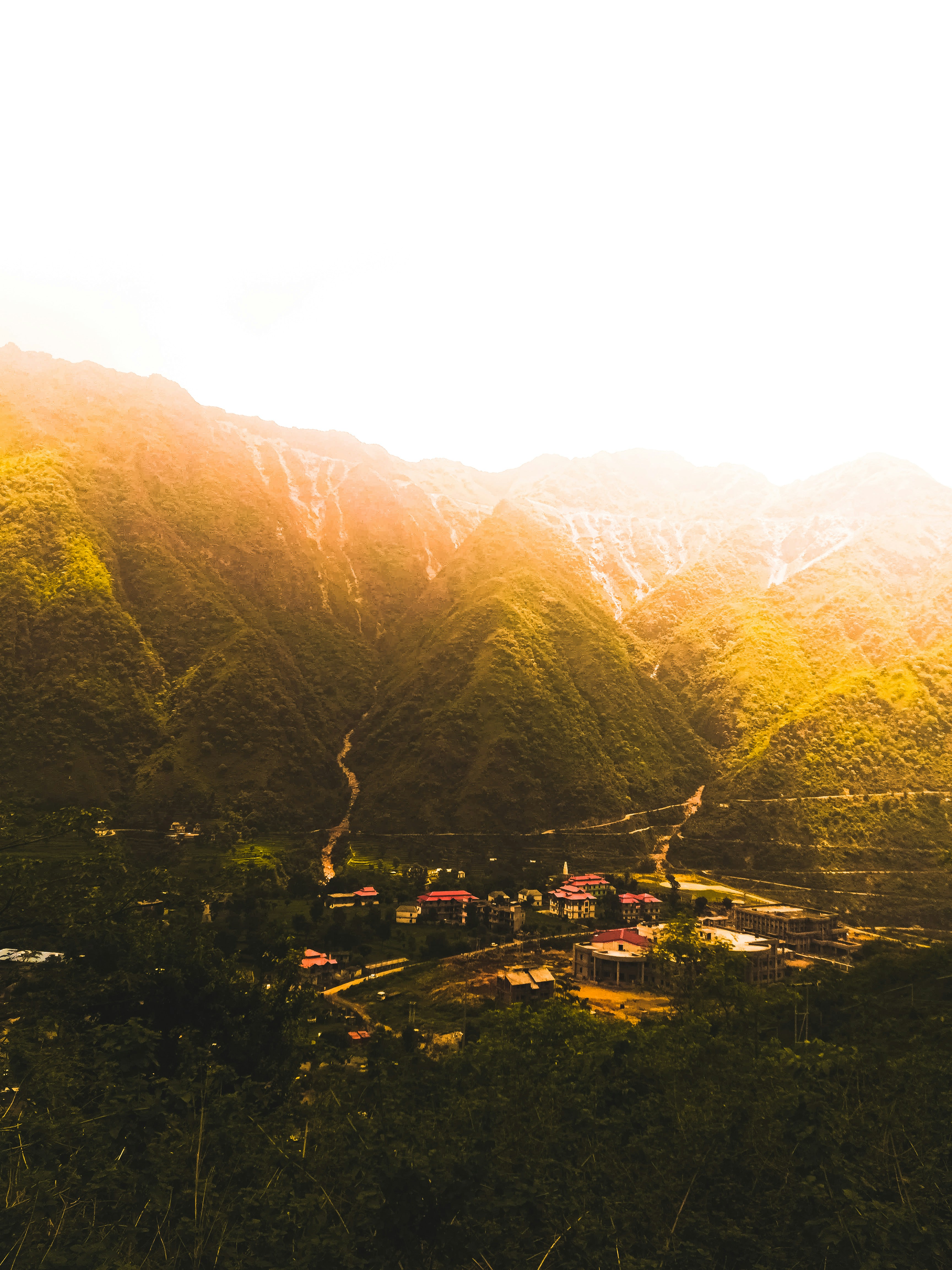 Quiet village tucked in the golden foothills at sundown