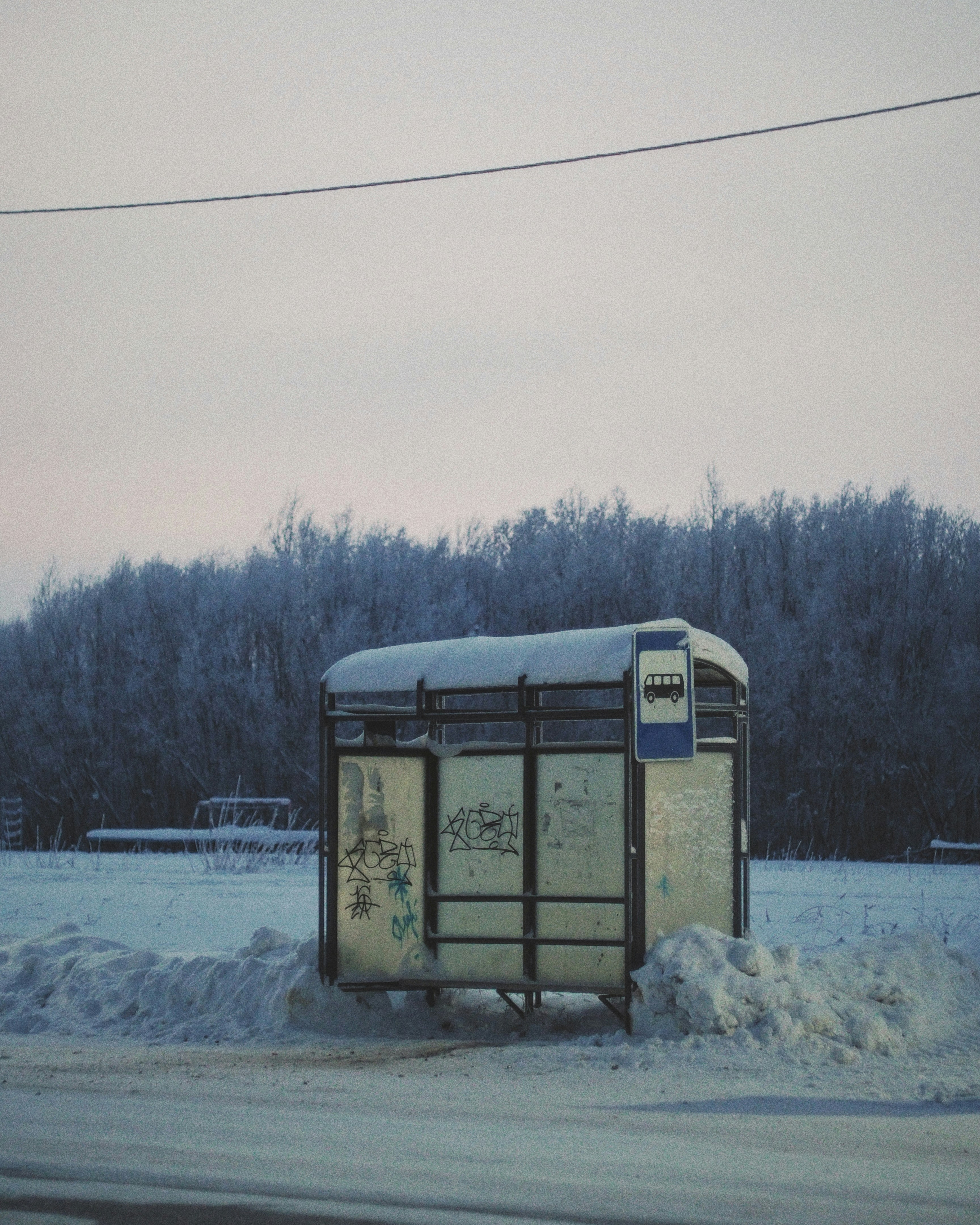 gray train on snow covered ground during daytime