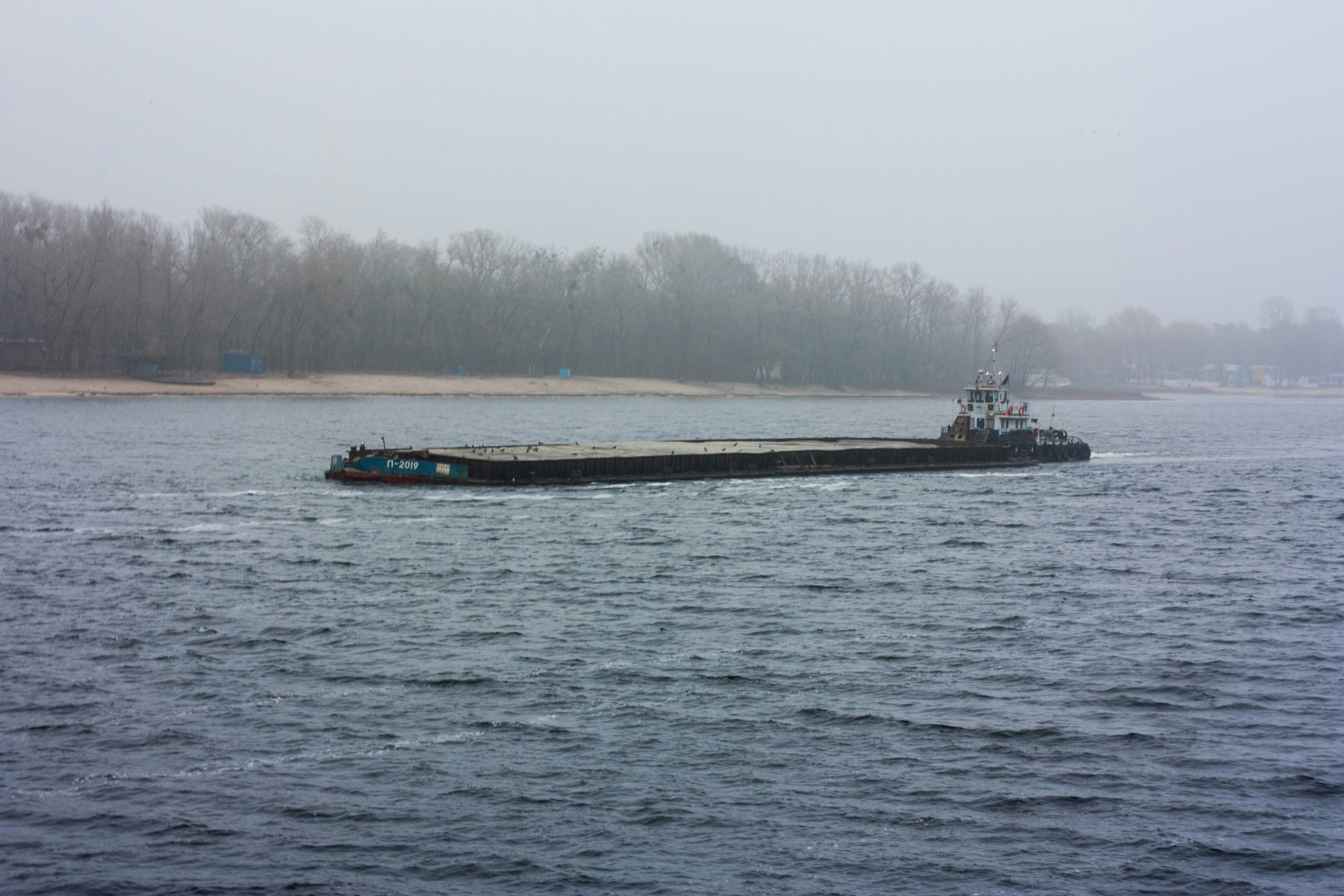 Black and red boat on sea during daytime photo – Free Grey Image on ...