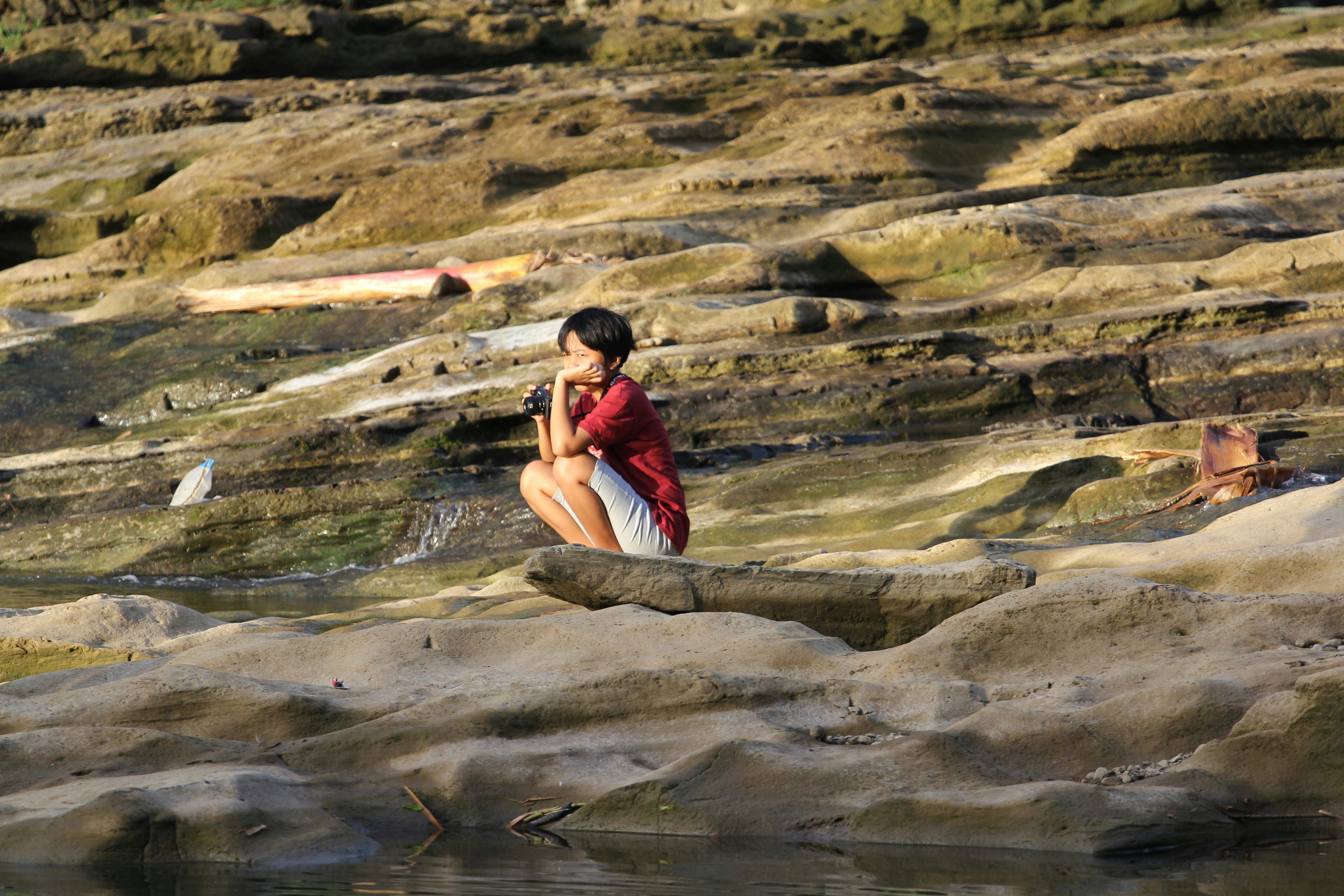 A Moment of Reflection by the Water's Edge