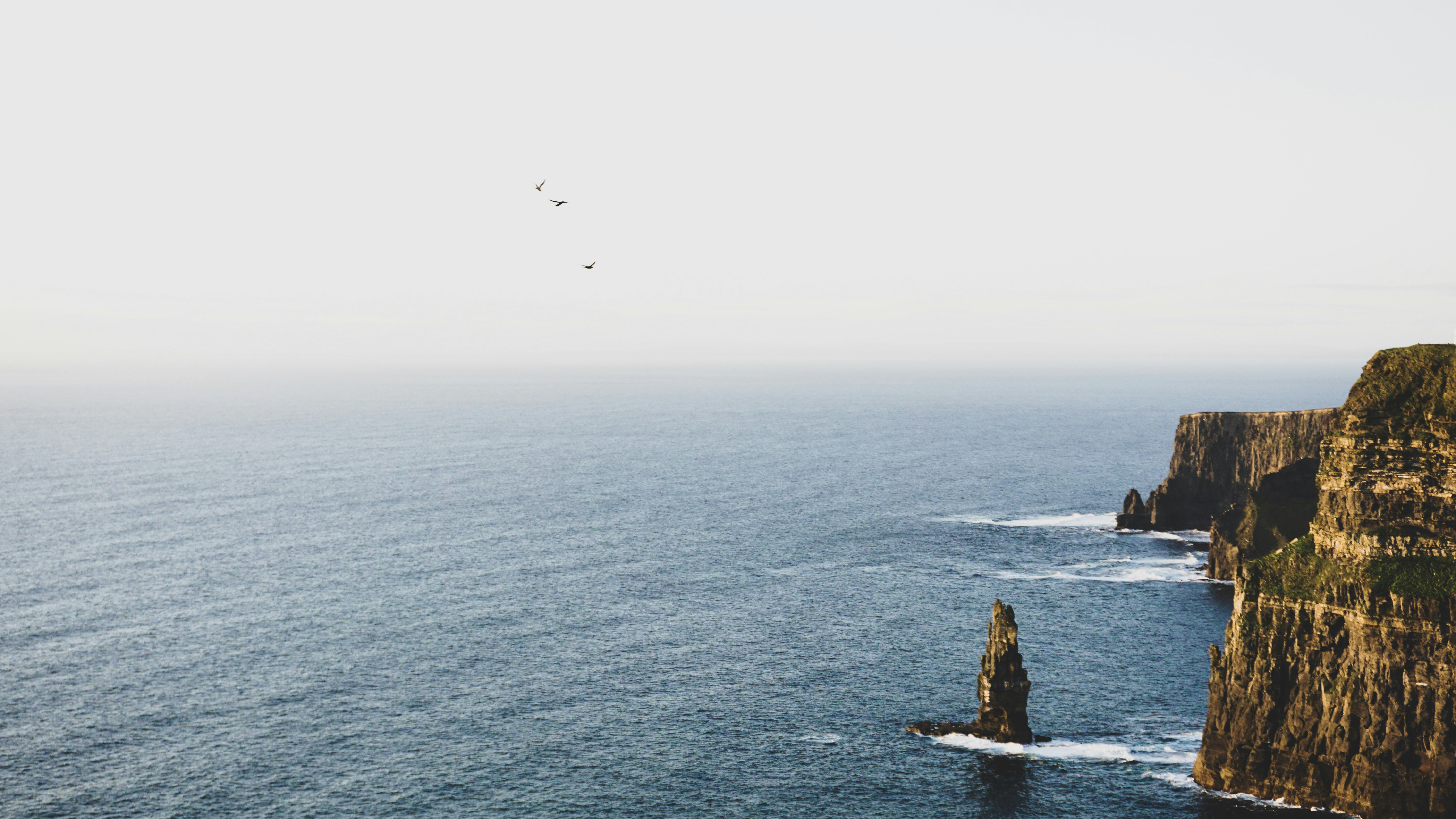 Edge of the Atlantic: Weathered Cliffs Meet the Quiet Sea