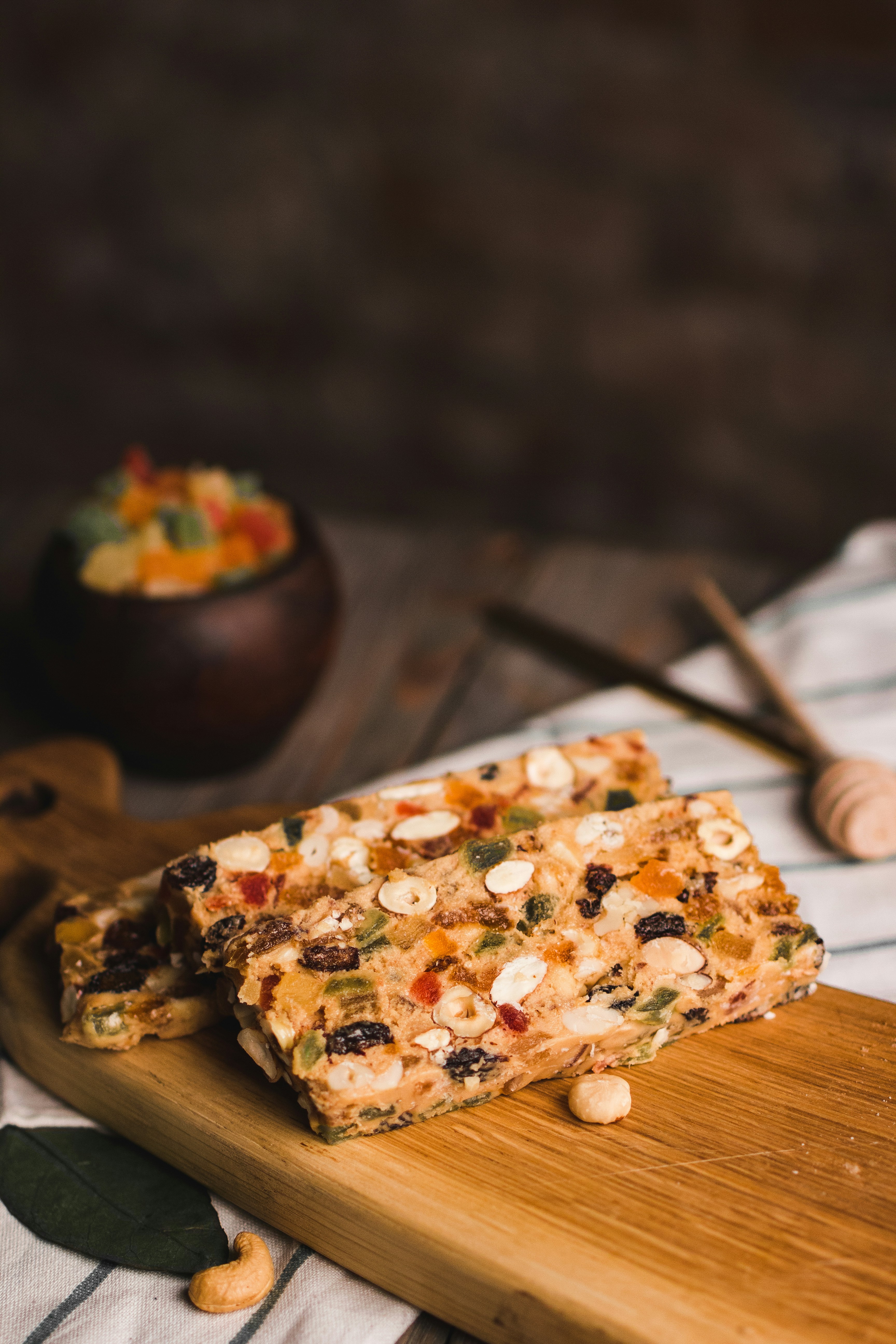 Golden Torrone Slices on a Rustic Cutting Board