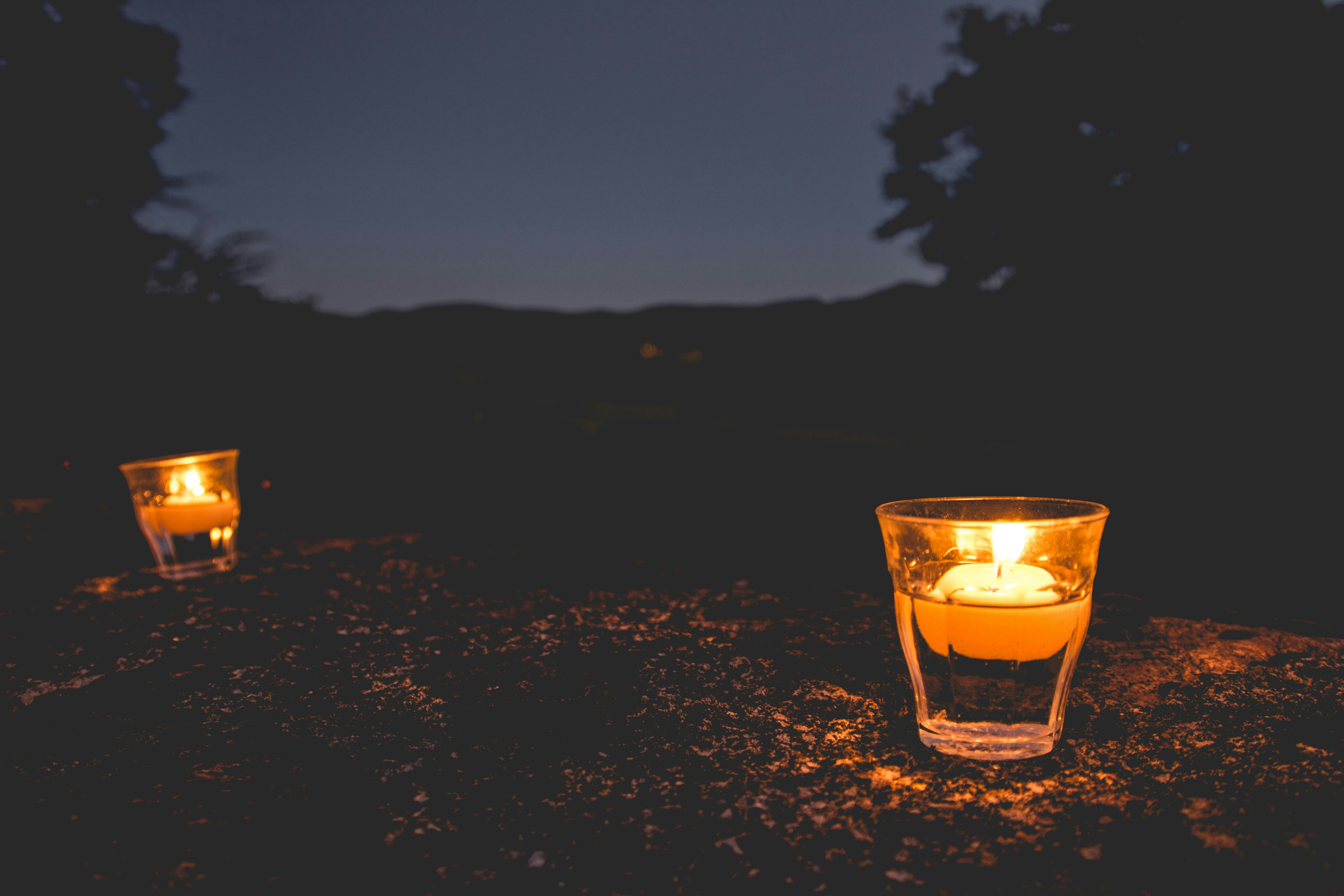 Two Candlelit Orbs on a Quiet Night