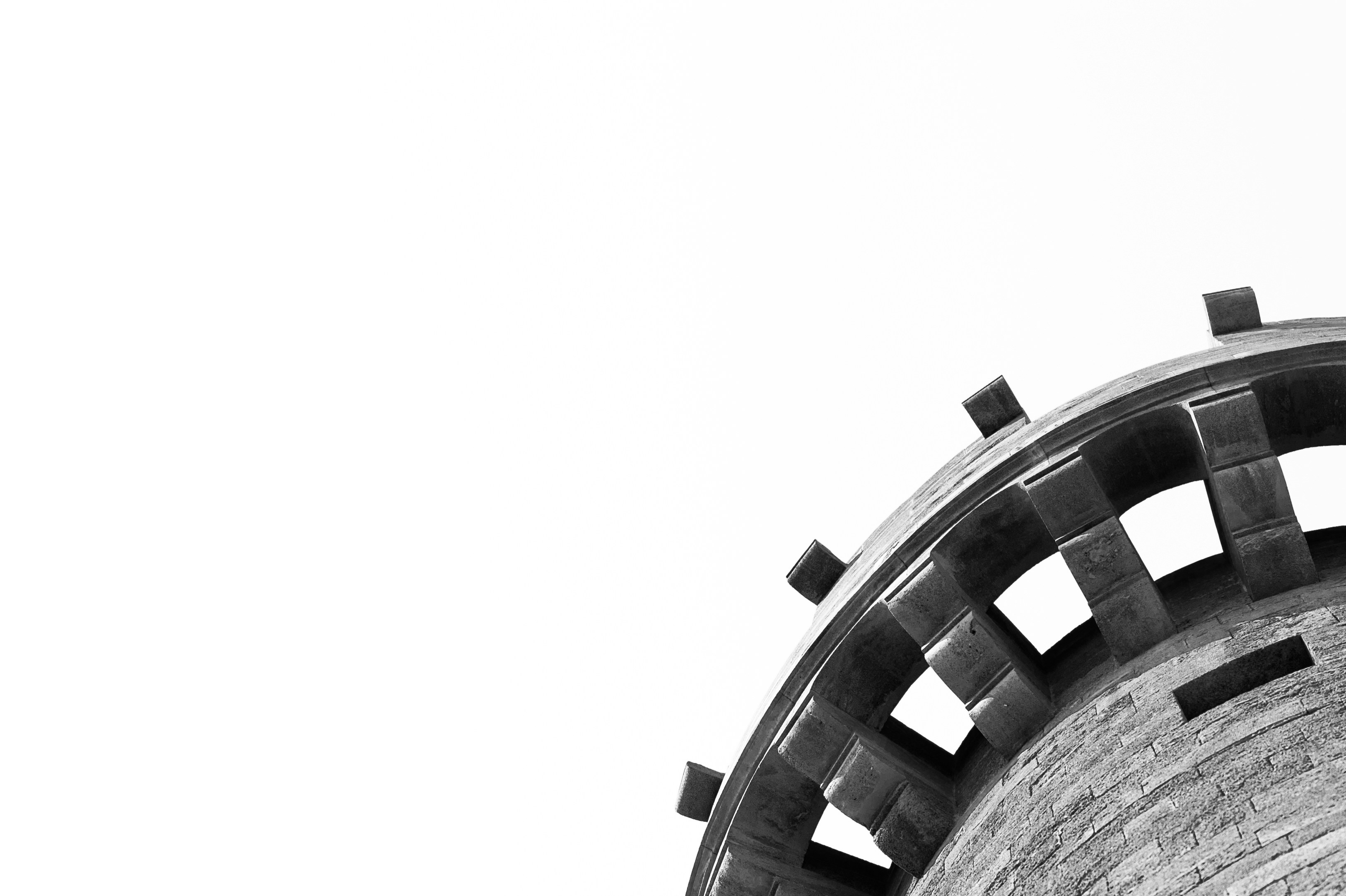 Grayscale photo of round building photo – Free Grey Image on Unsplash