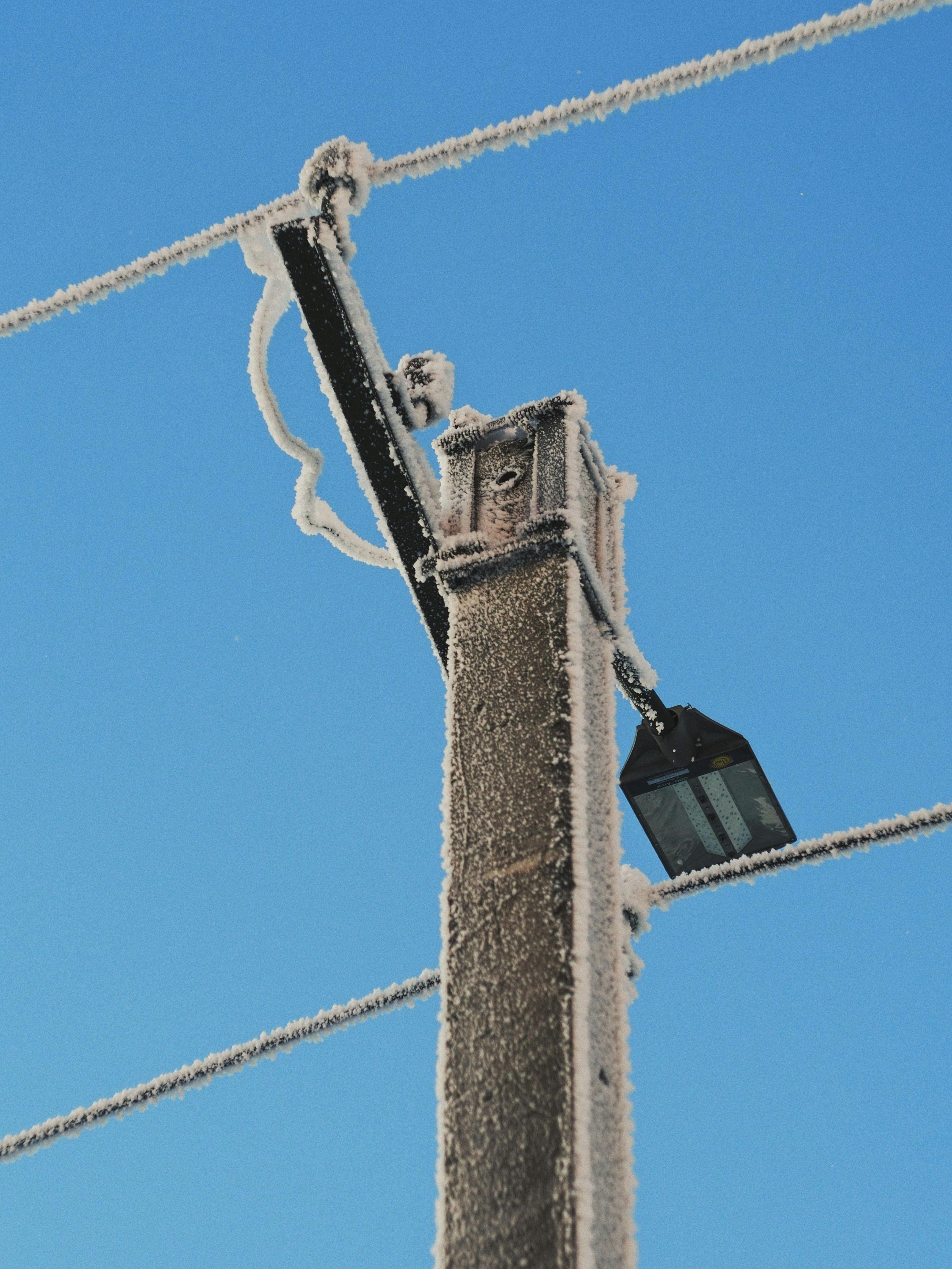brown wooden cross with cross on top
