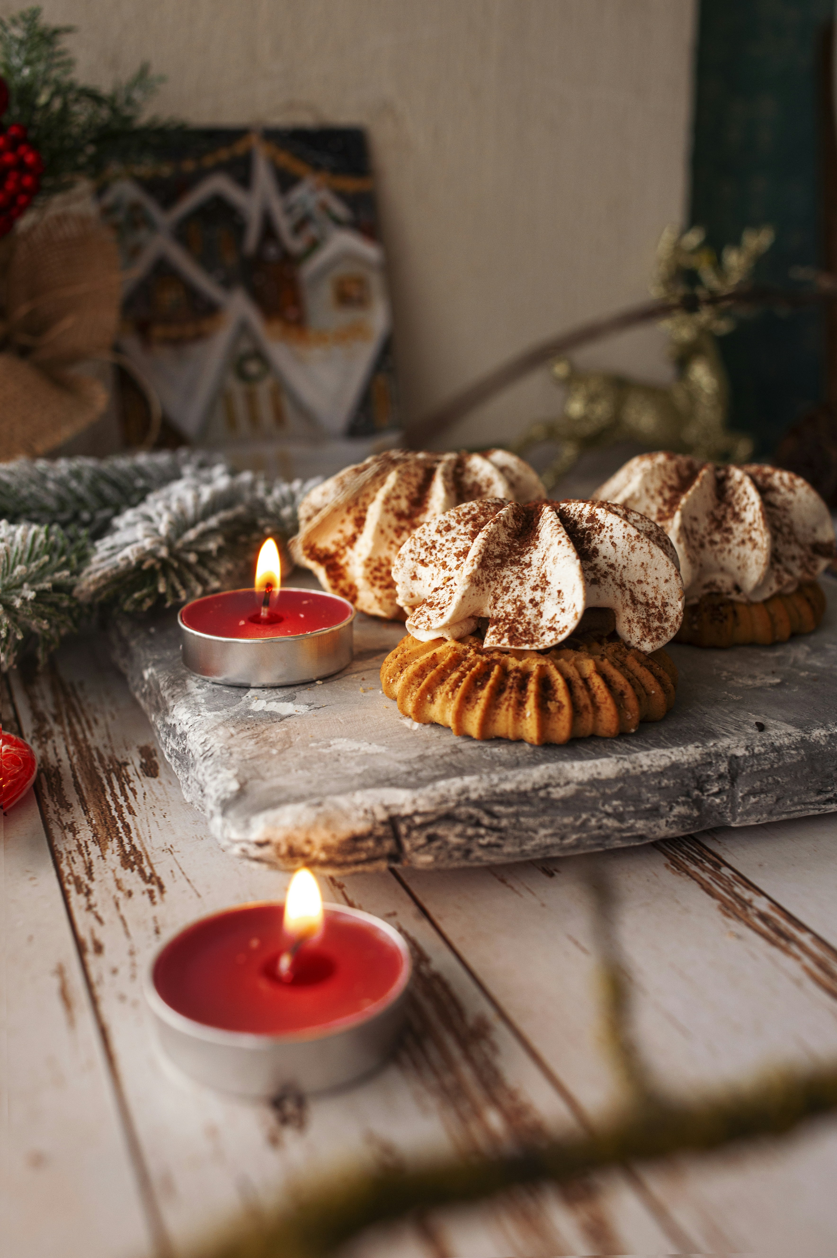 Candlelit Meringue Ornaments on a Frosted Slate