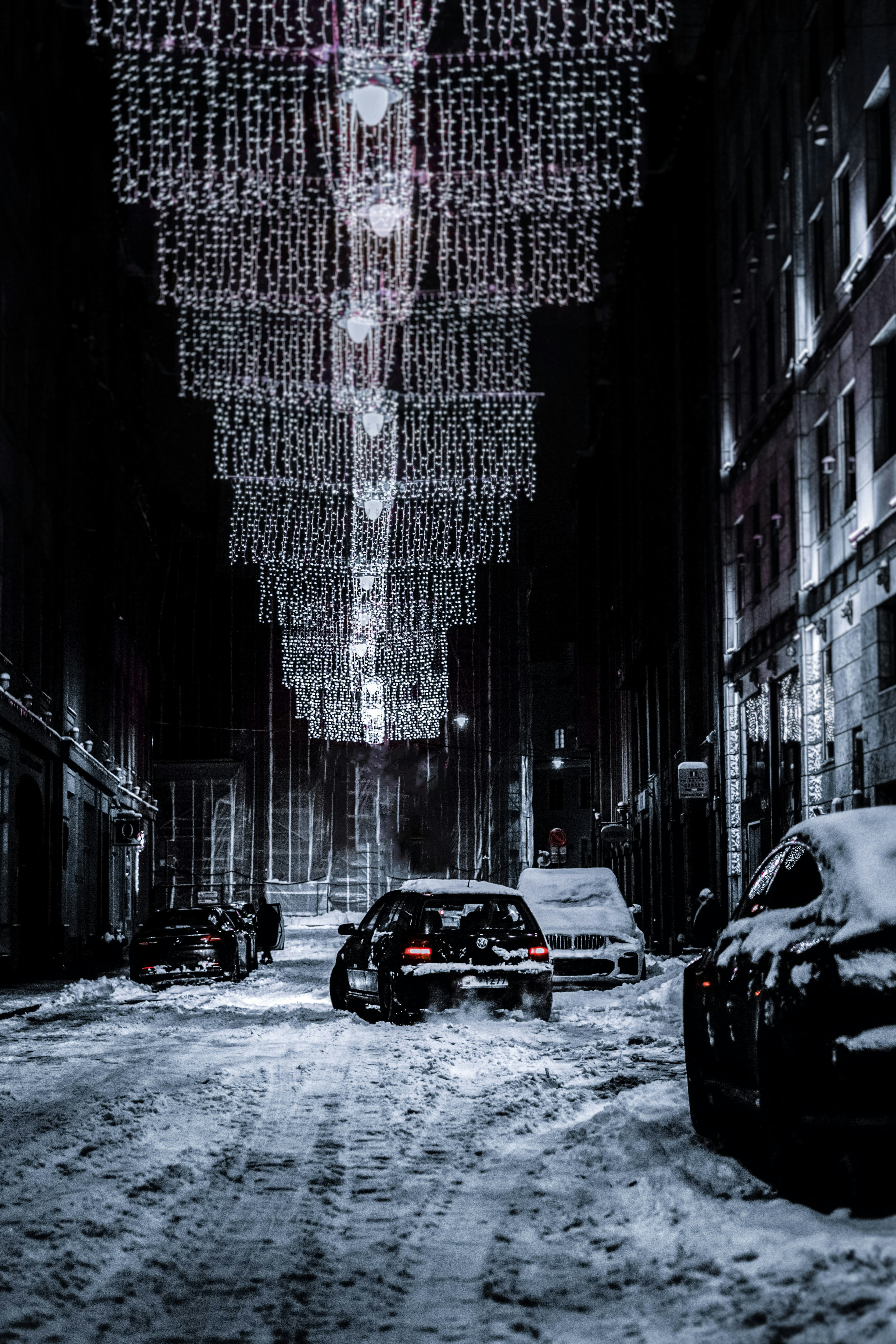 Canopy of Fairy Lights over a Snowbound City Street