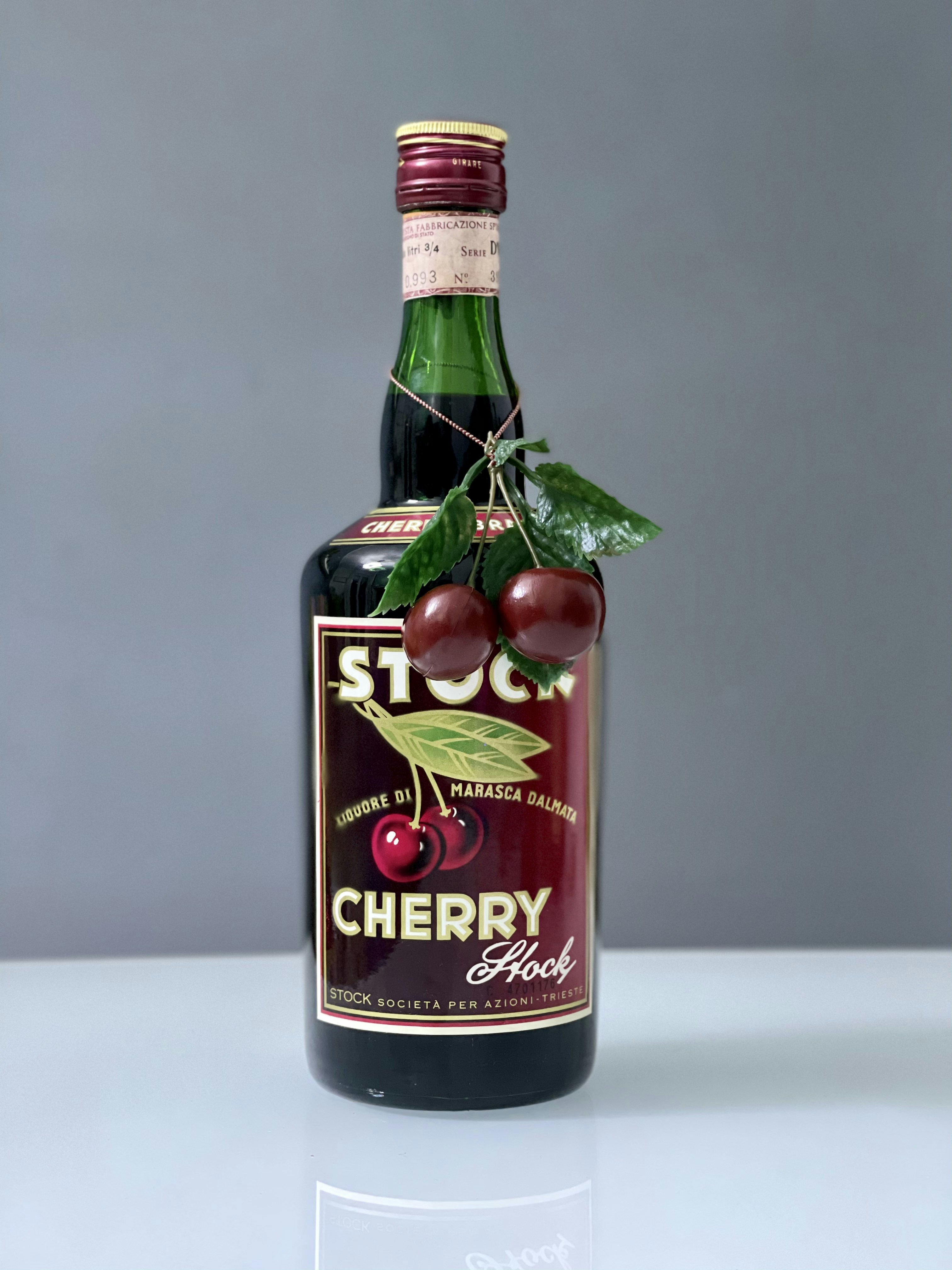 Crimson Label, Hanging Cherries: A Still Life of Cherry Liqueur
