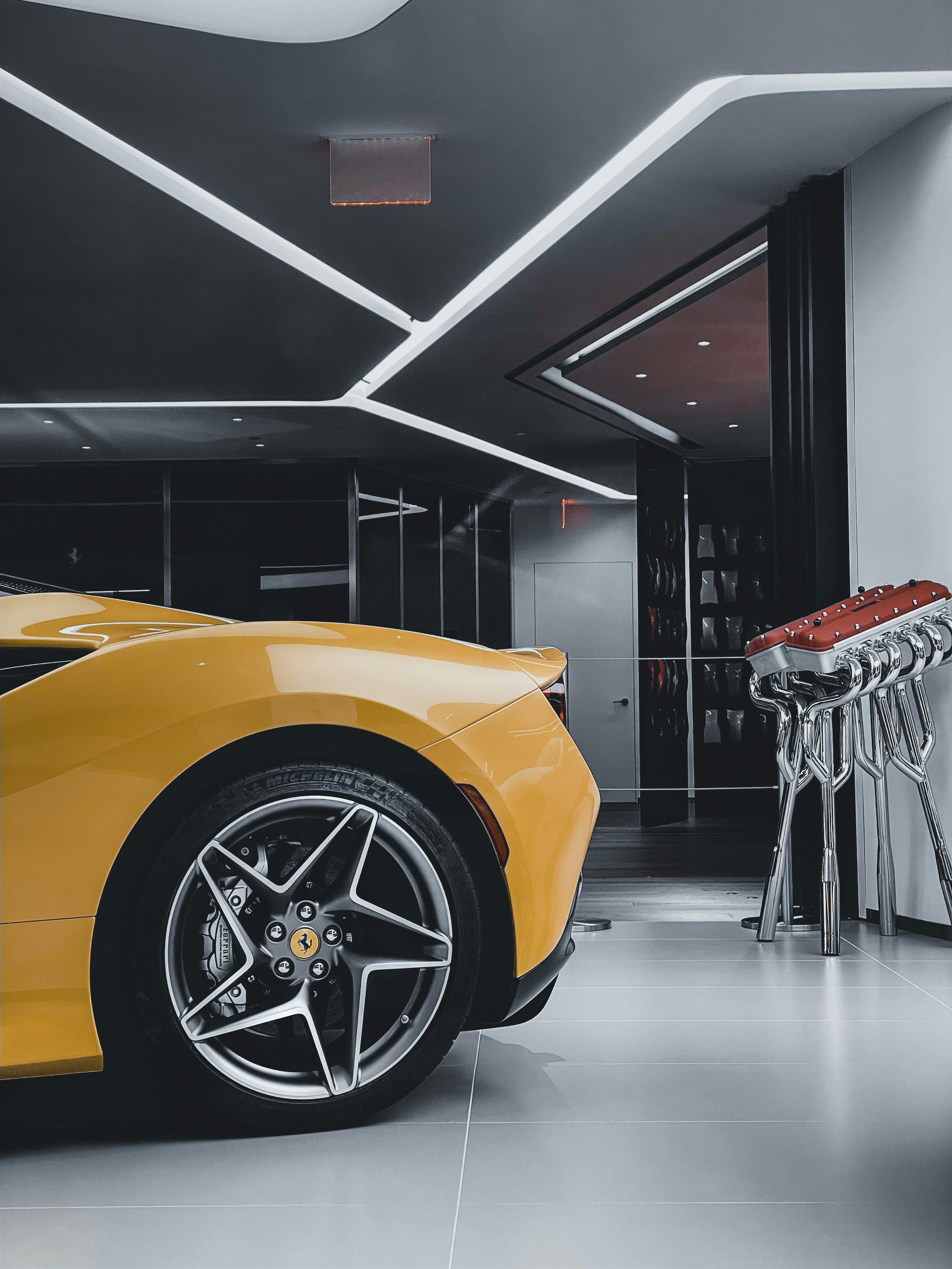 Orange Ferrari Corner: Precision Wheels in a Modern Showroom