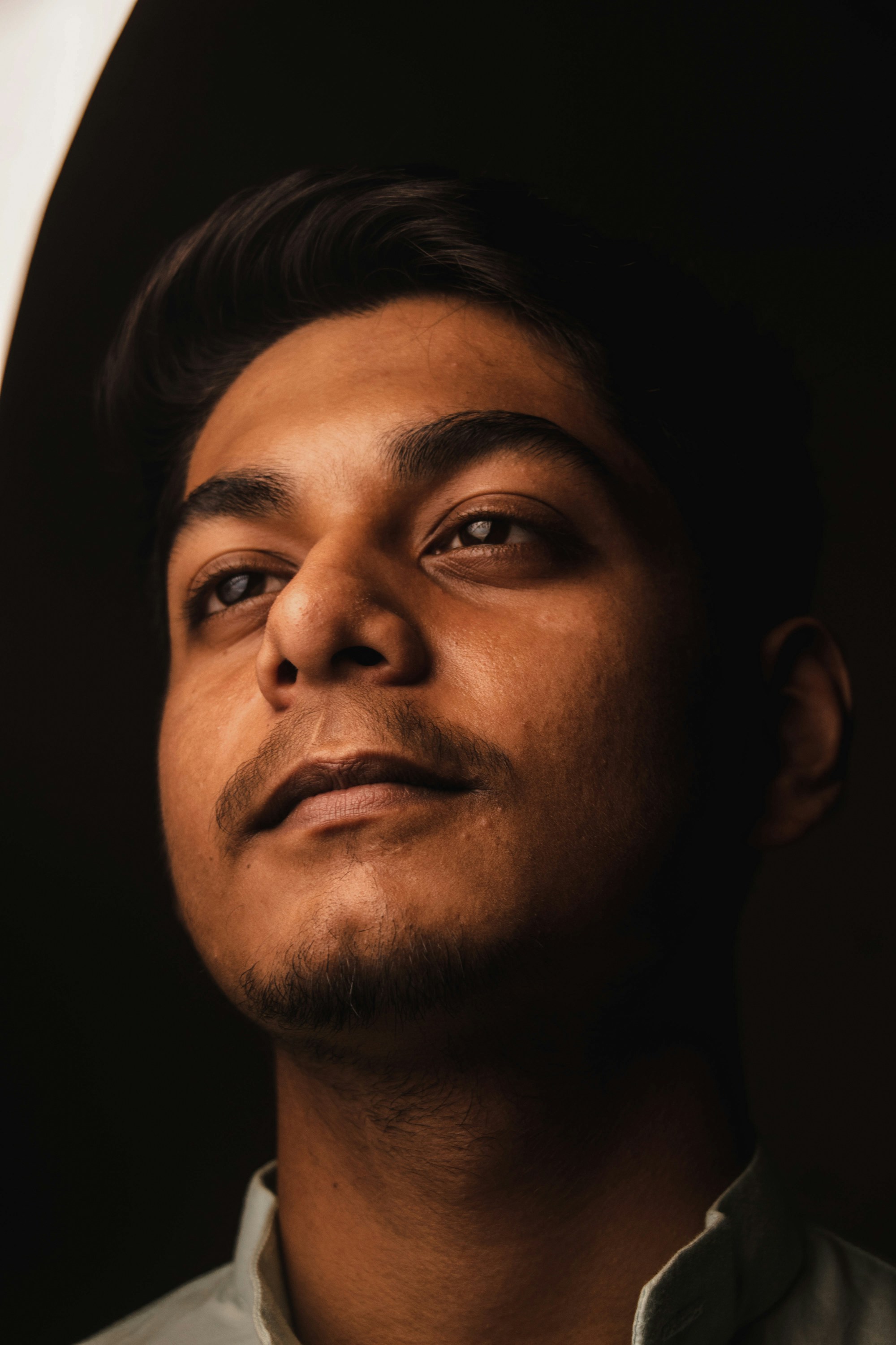 Mans face in dark room photo – Free Black Image on Unsplash