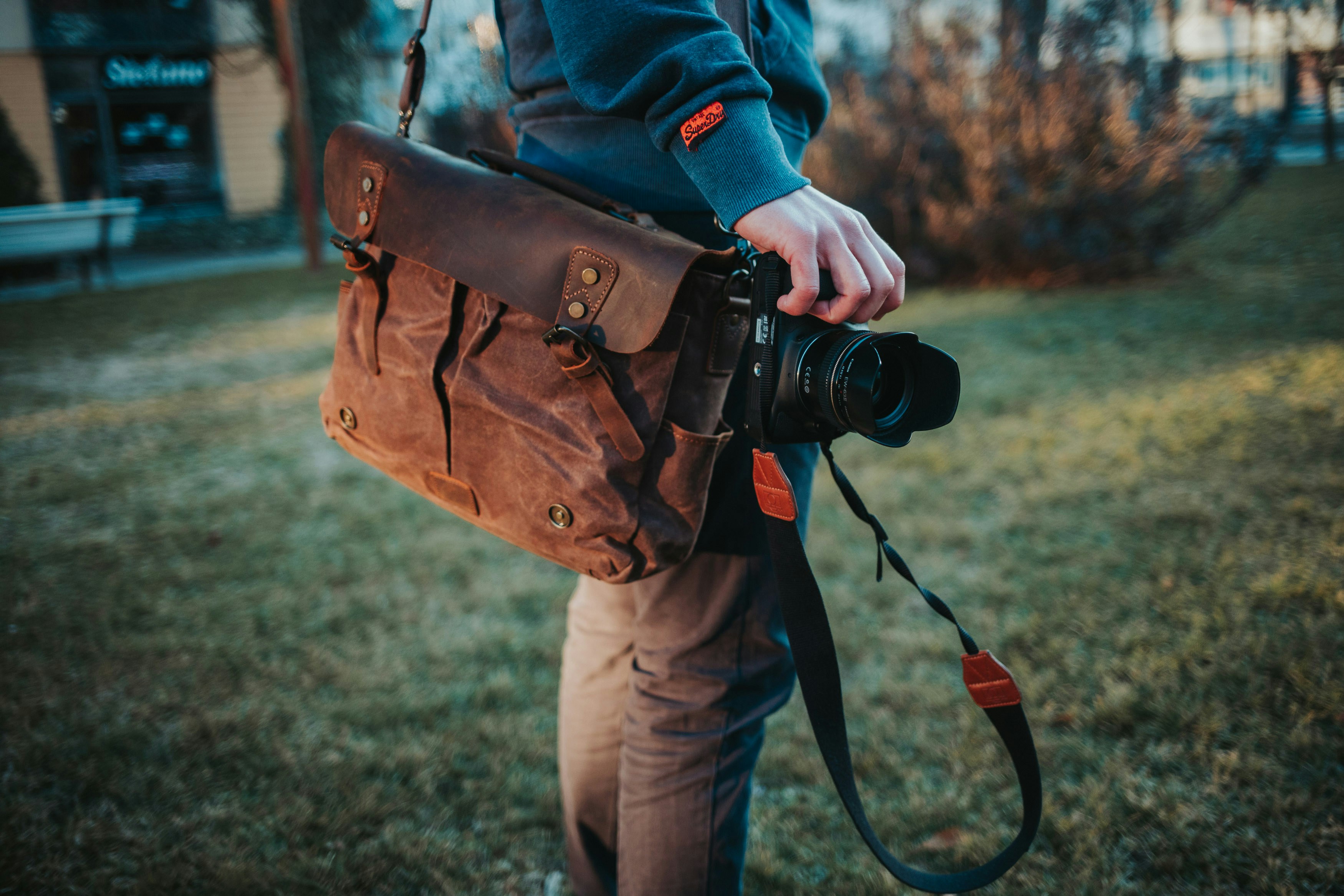 Carrying Light: A Photographer's Portable Studio on a Park Evening