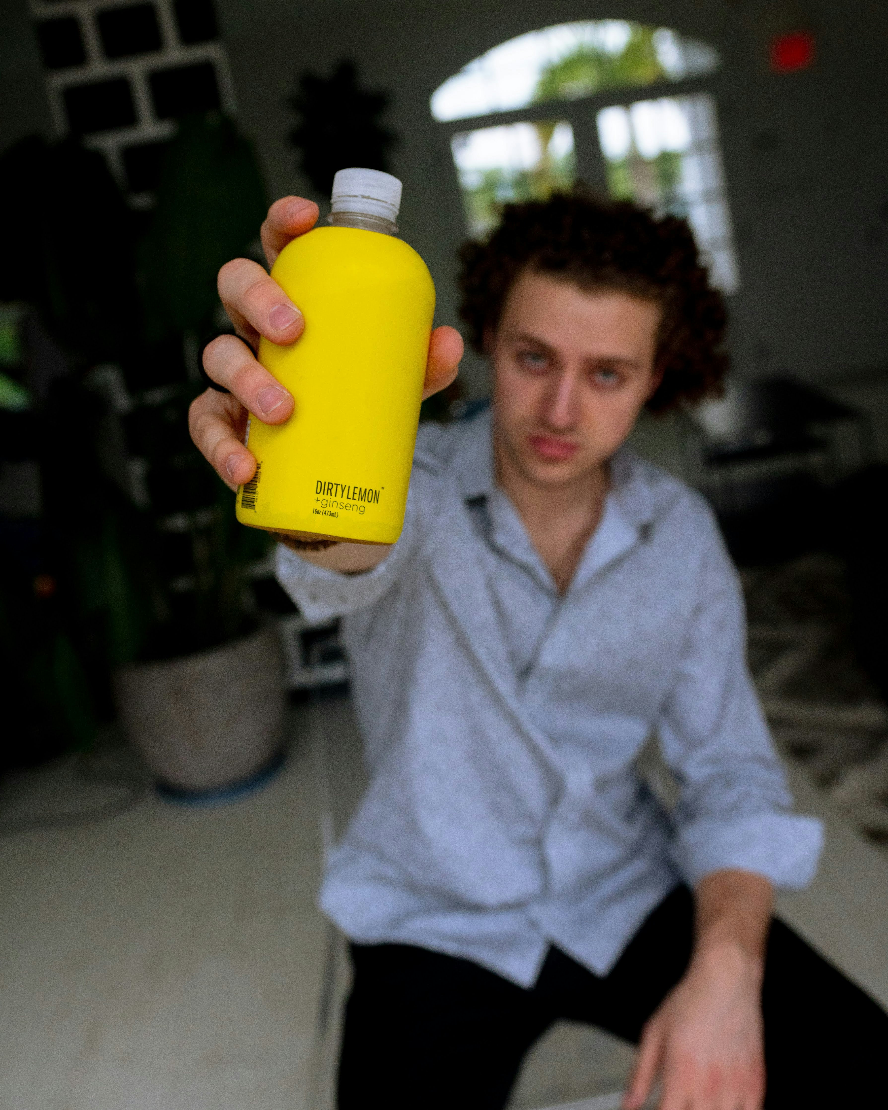 Yellow Bottle, Quiet Intensity: A Closer Look at a Casual Moment
