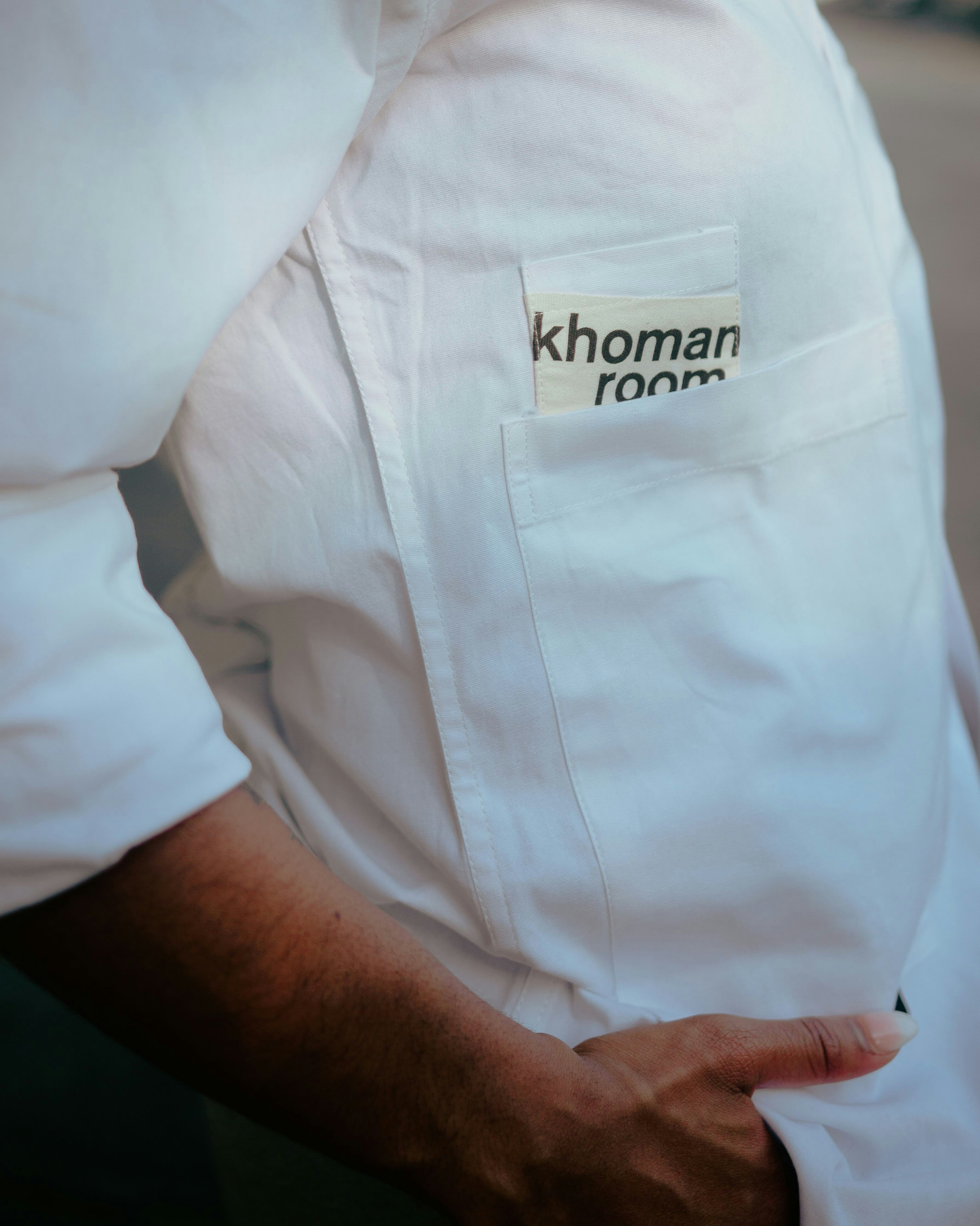 Whisper of Identity: The Pocket Label in a White Lab Coat