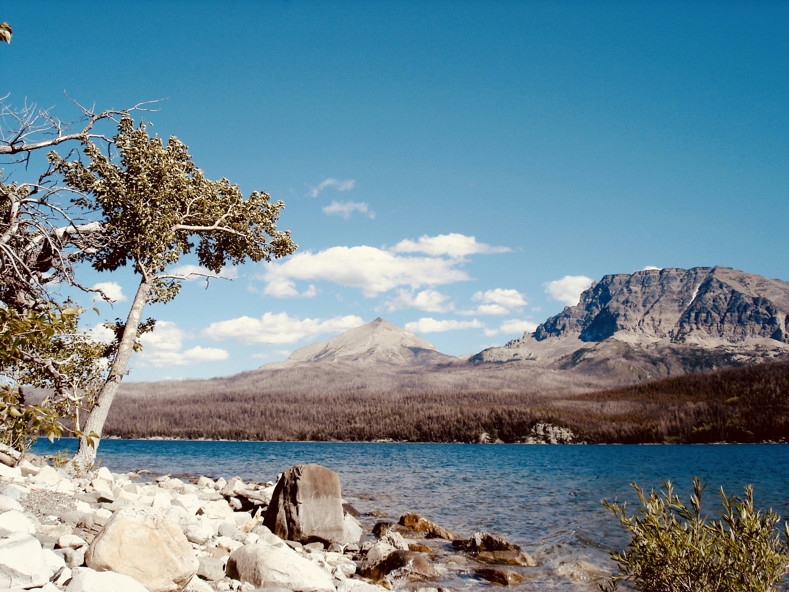 Azure Basin: Mountain Ridge Over a Quiet Lake