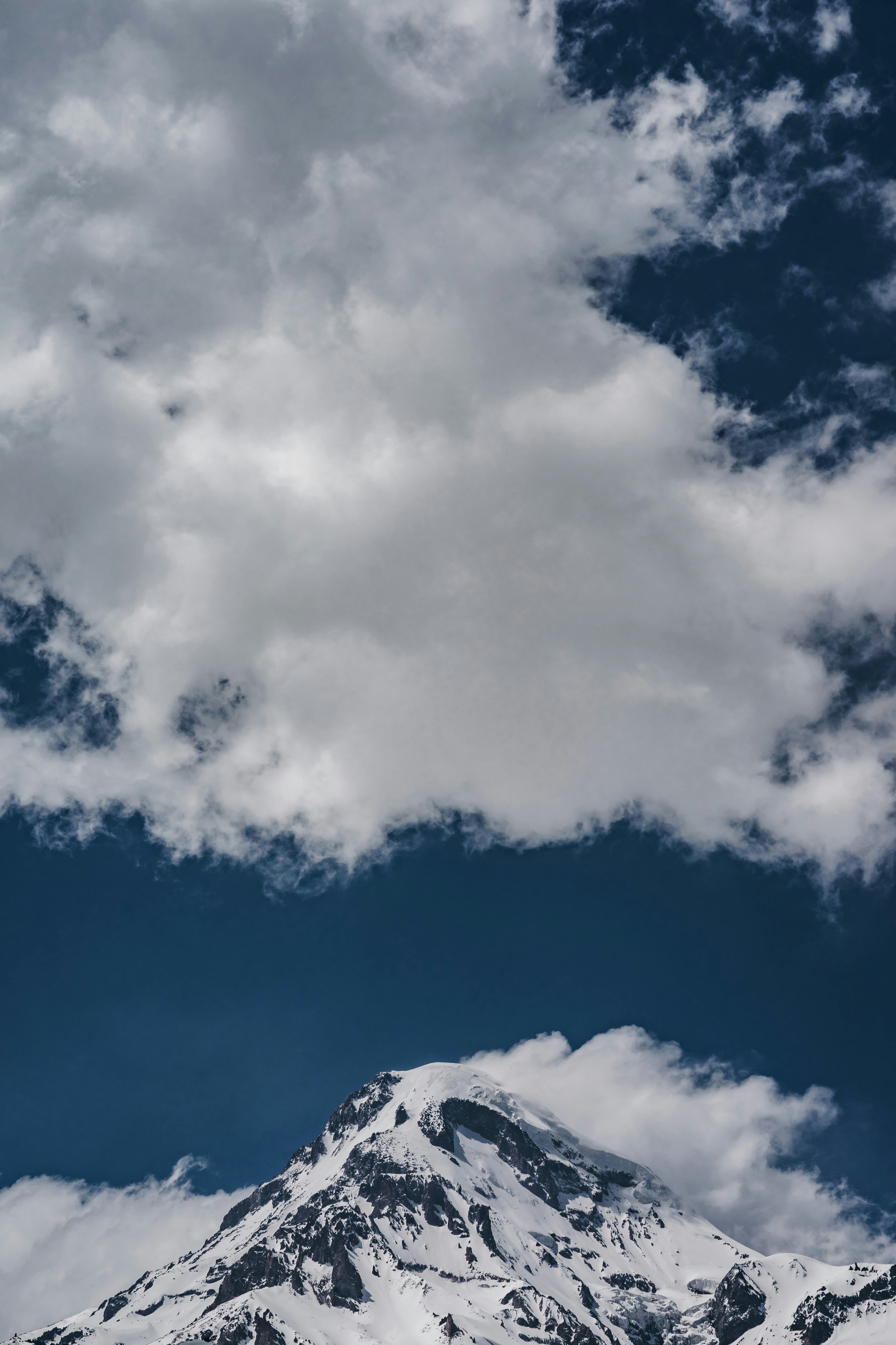 Ivory Summit Beneath a Velvet Cerulean Sky