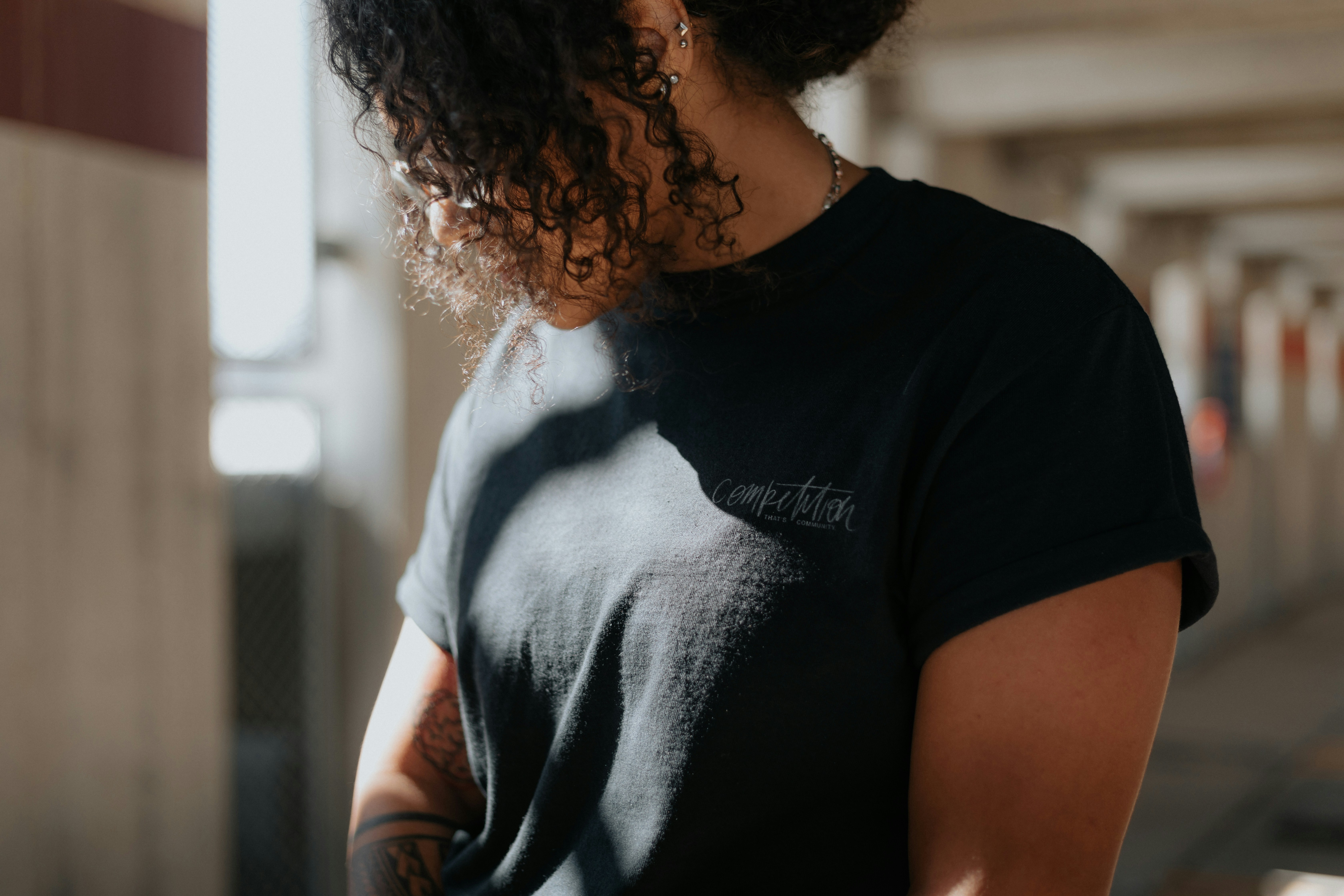 woman in black and white crew neck t-shirt