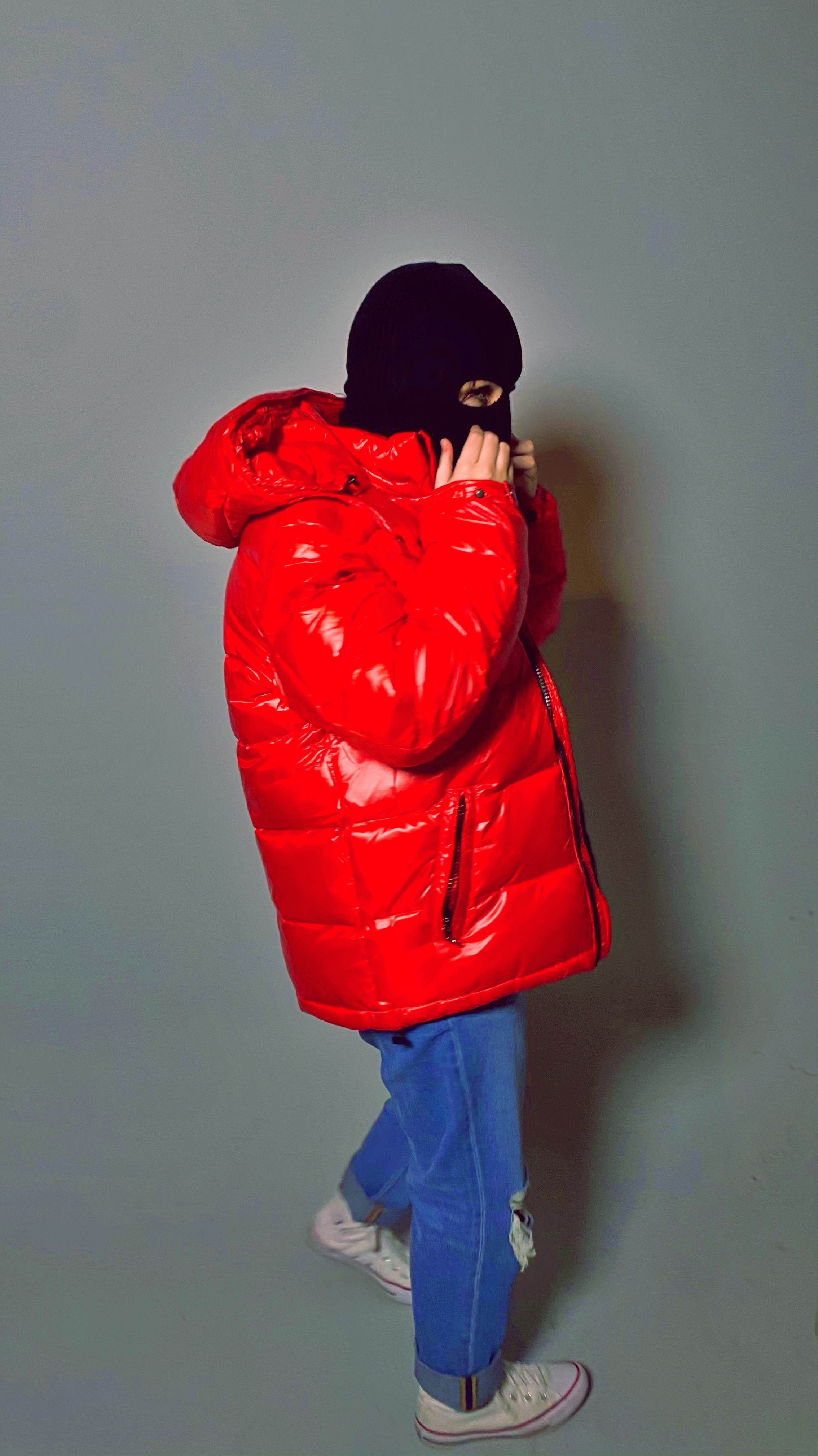 Woman in red leather jacket covering face photo – Free Detroit Image on ...