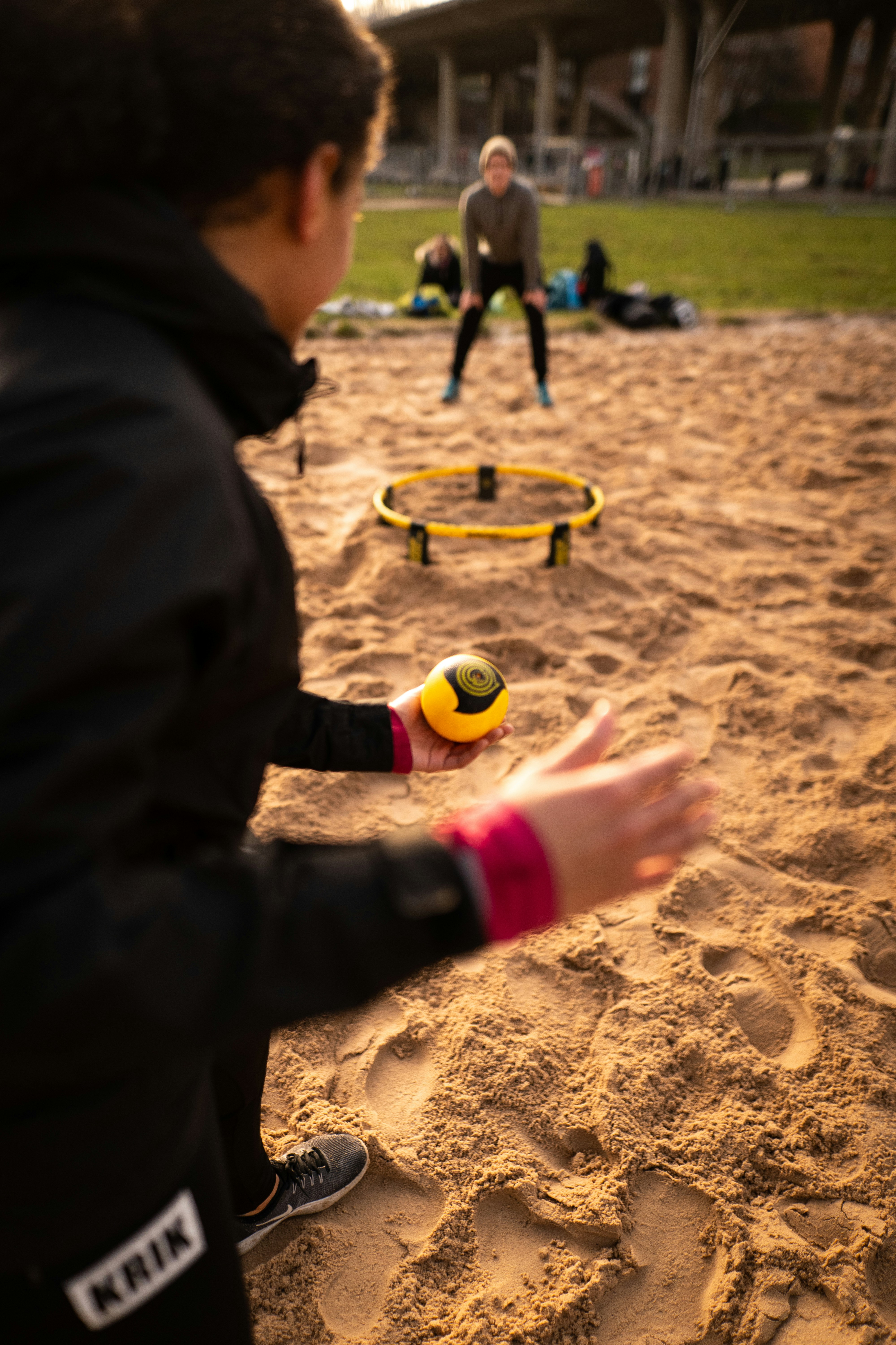 People playing on sand during daytime photo – Free Sand Image on Unsplash