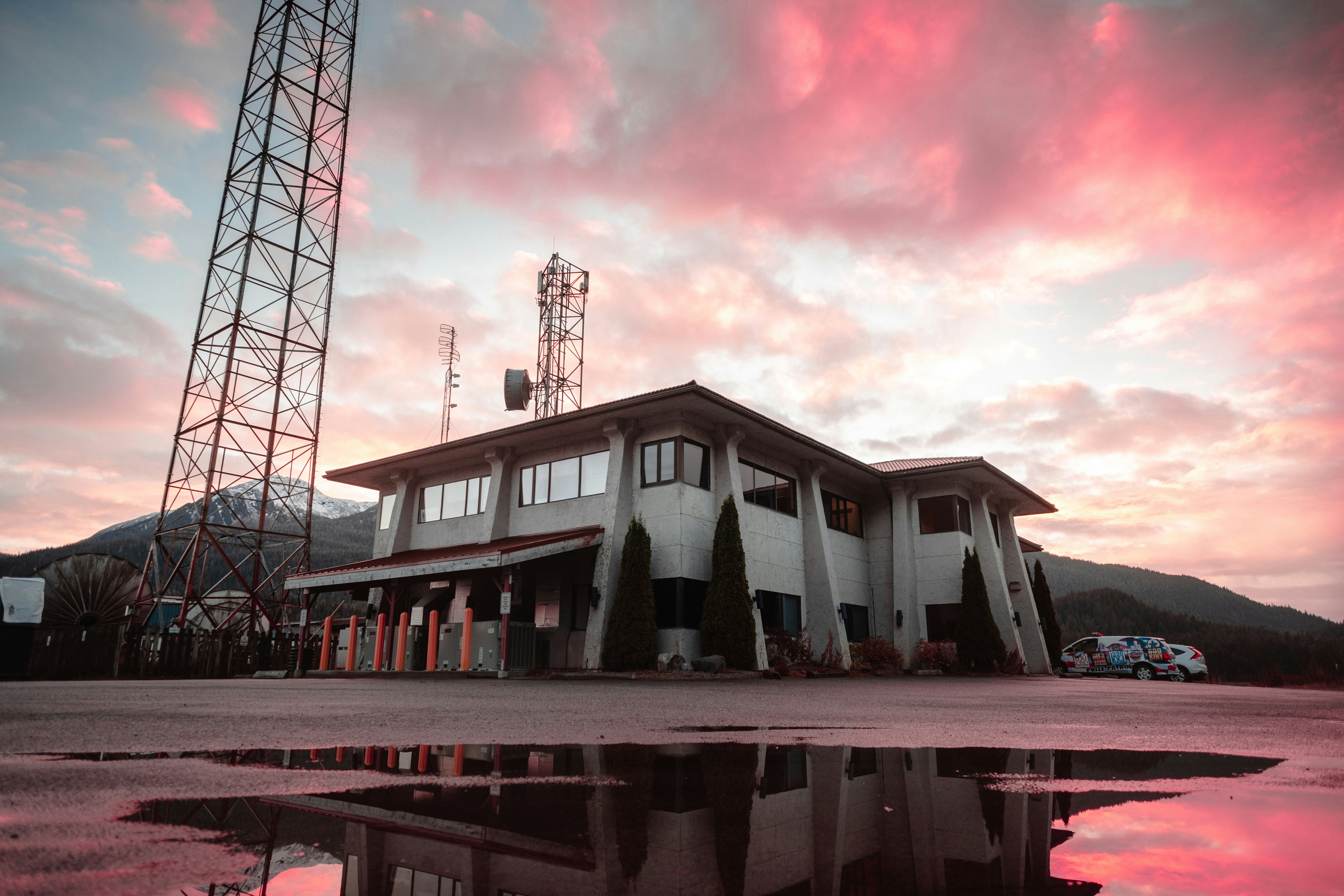 Juneau Radio Center during a pink sunset.