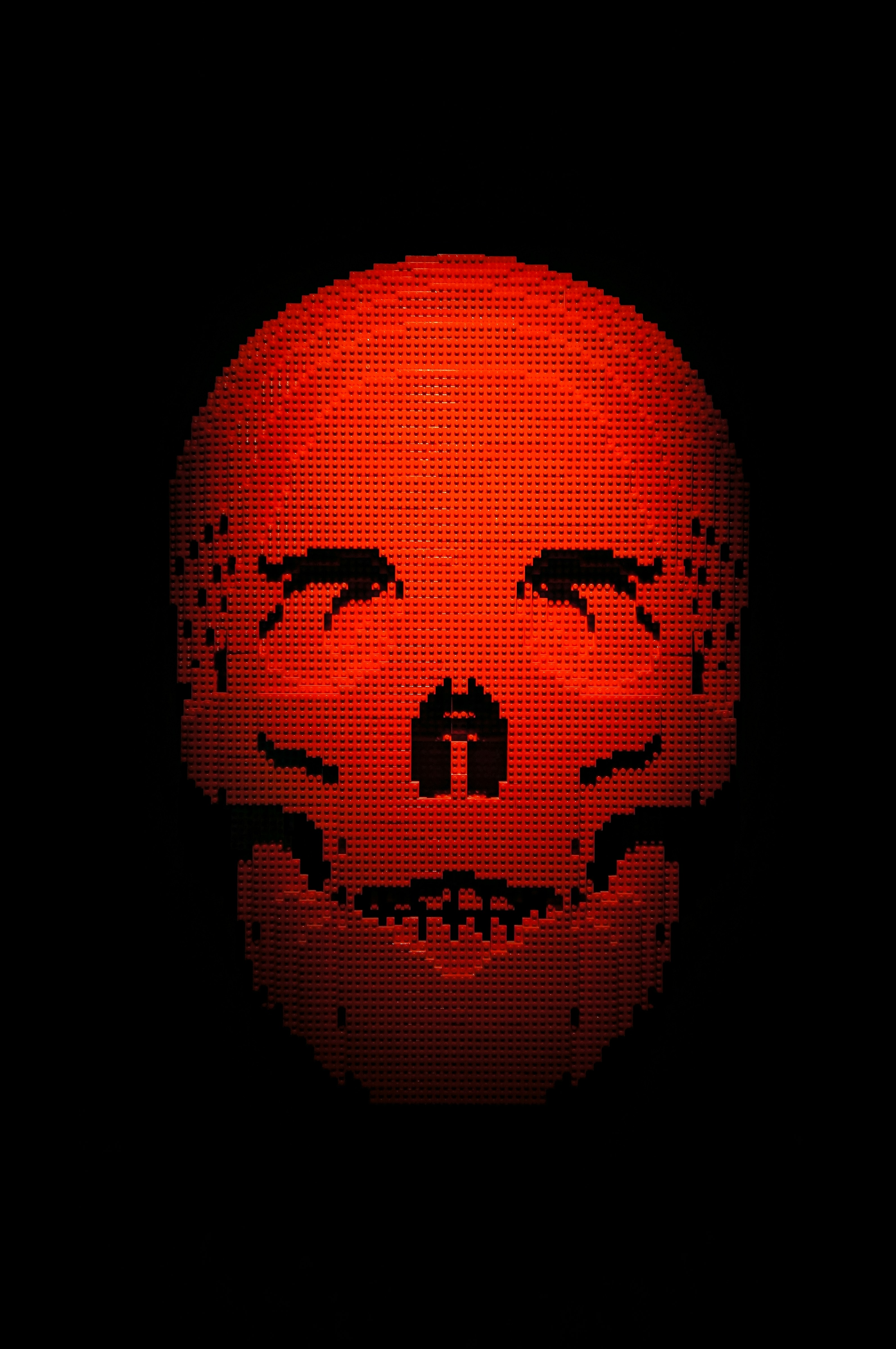 Red Mask of Echoes: A Faceted Portrait in Binary Silence