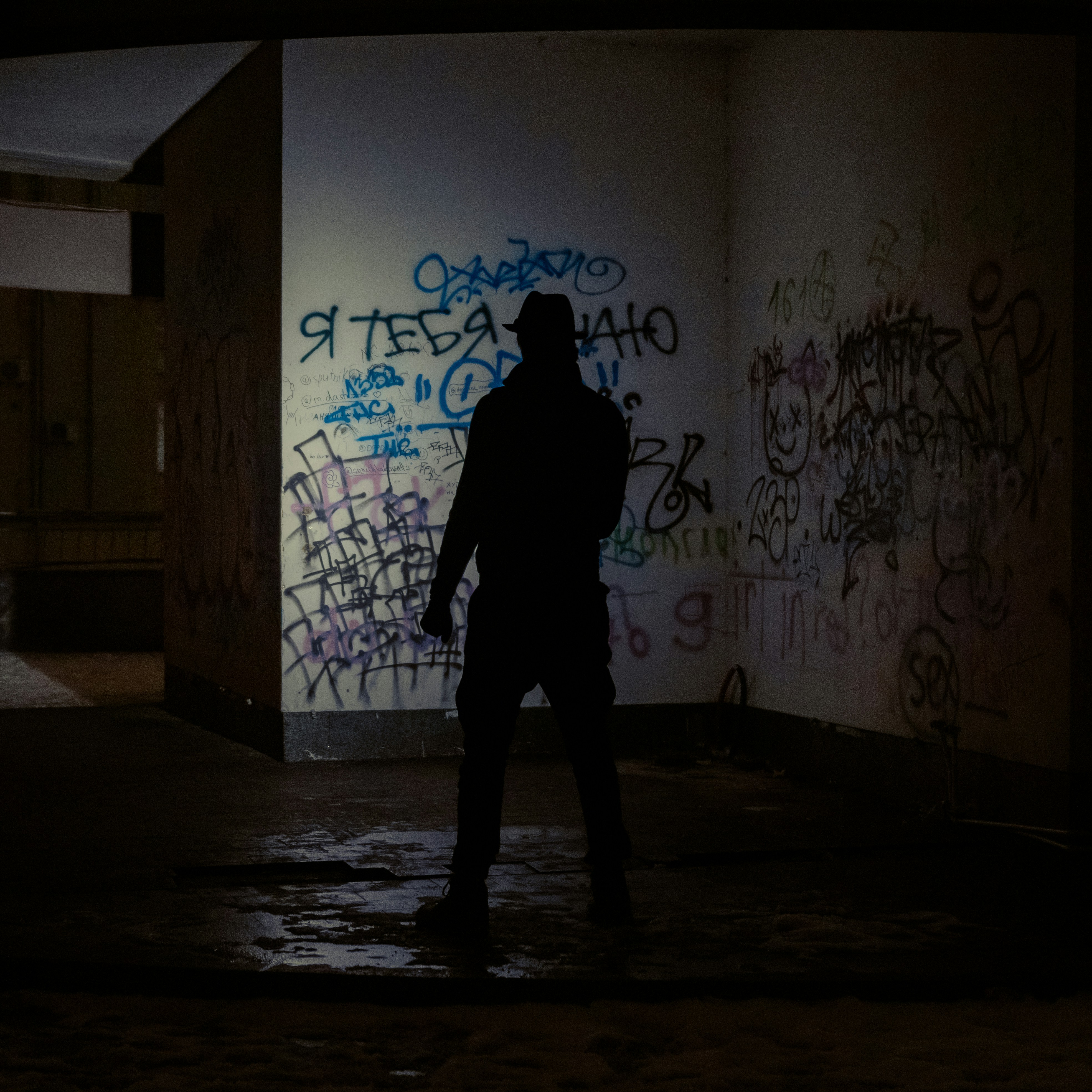 silhouette of person walking on hallwayMaksym Tymchyk 🇺🇦