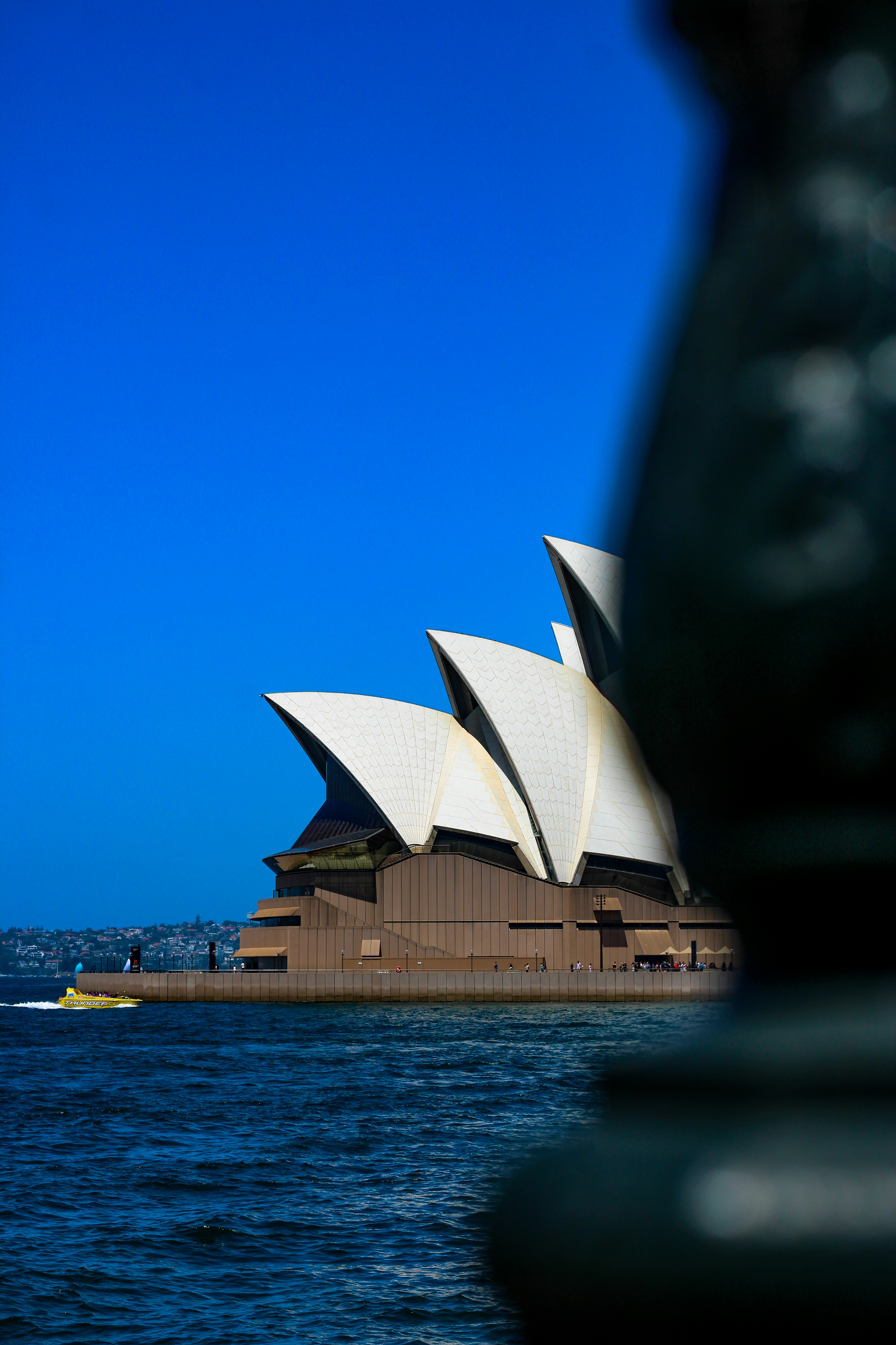 Geometry of Sails: Sydney Opera House Framing a Blue Harbour