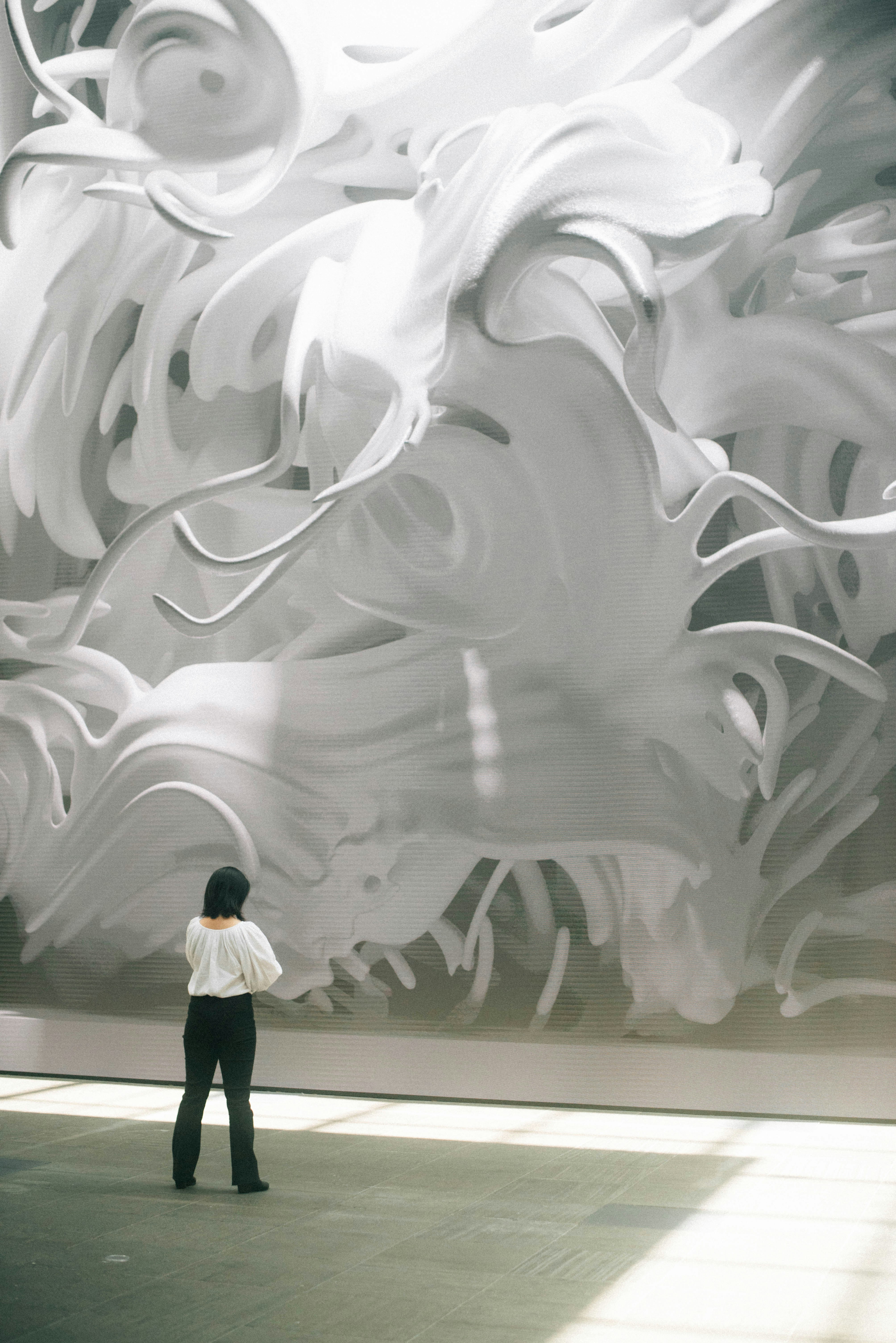 Whispers of Ink: A Visitor Before the Grand Abstract