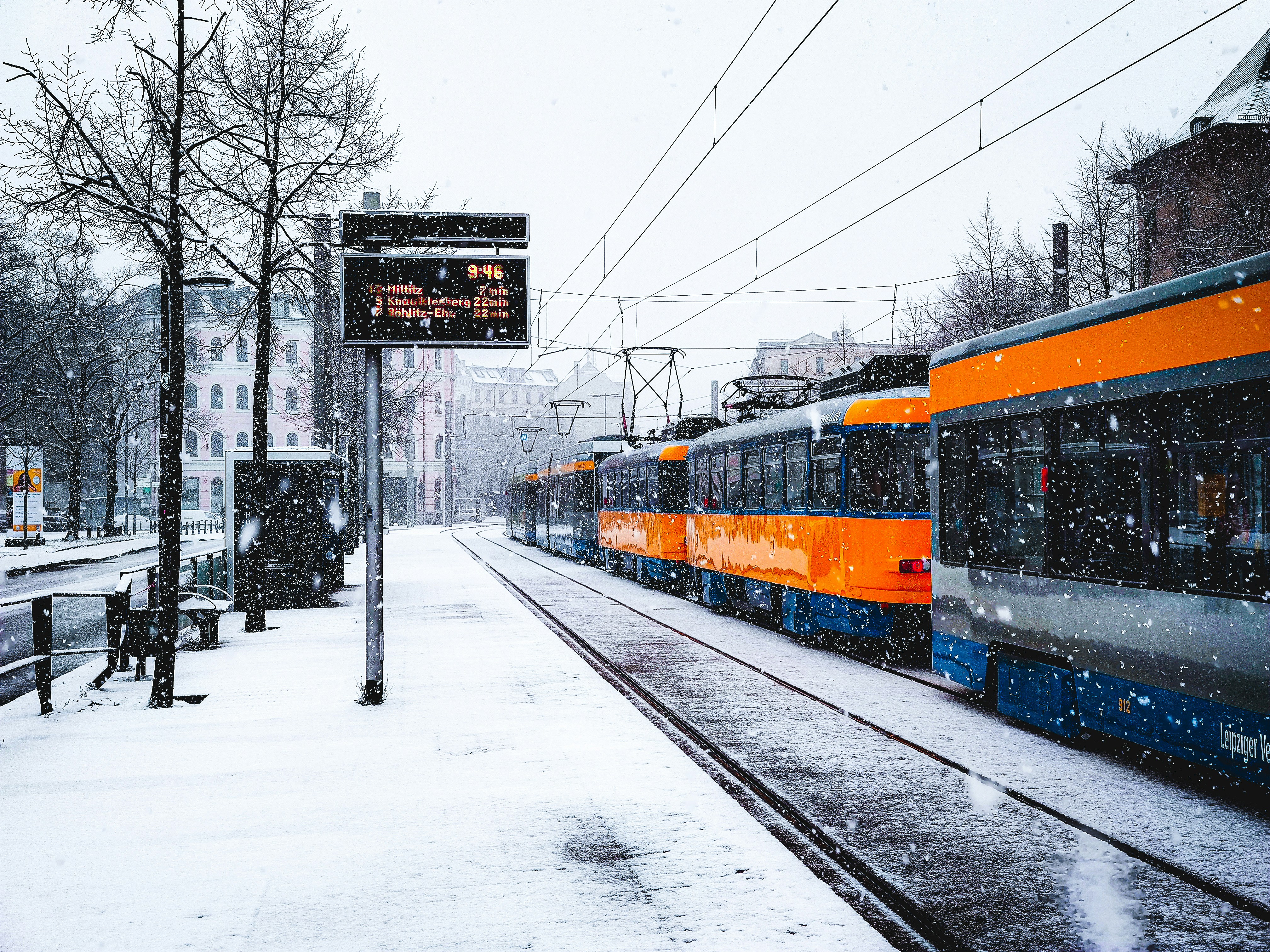 Red and black train on rail tracks during daytime photo – Free Train ...