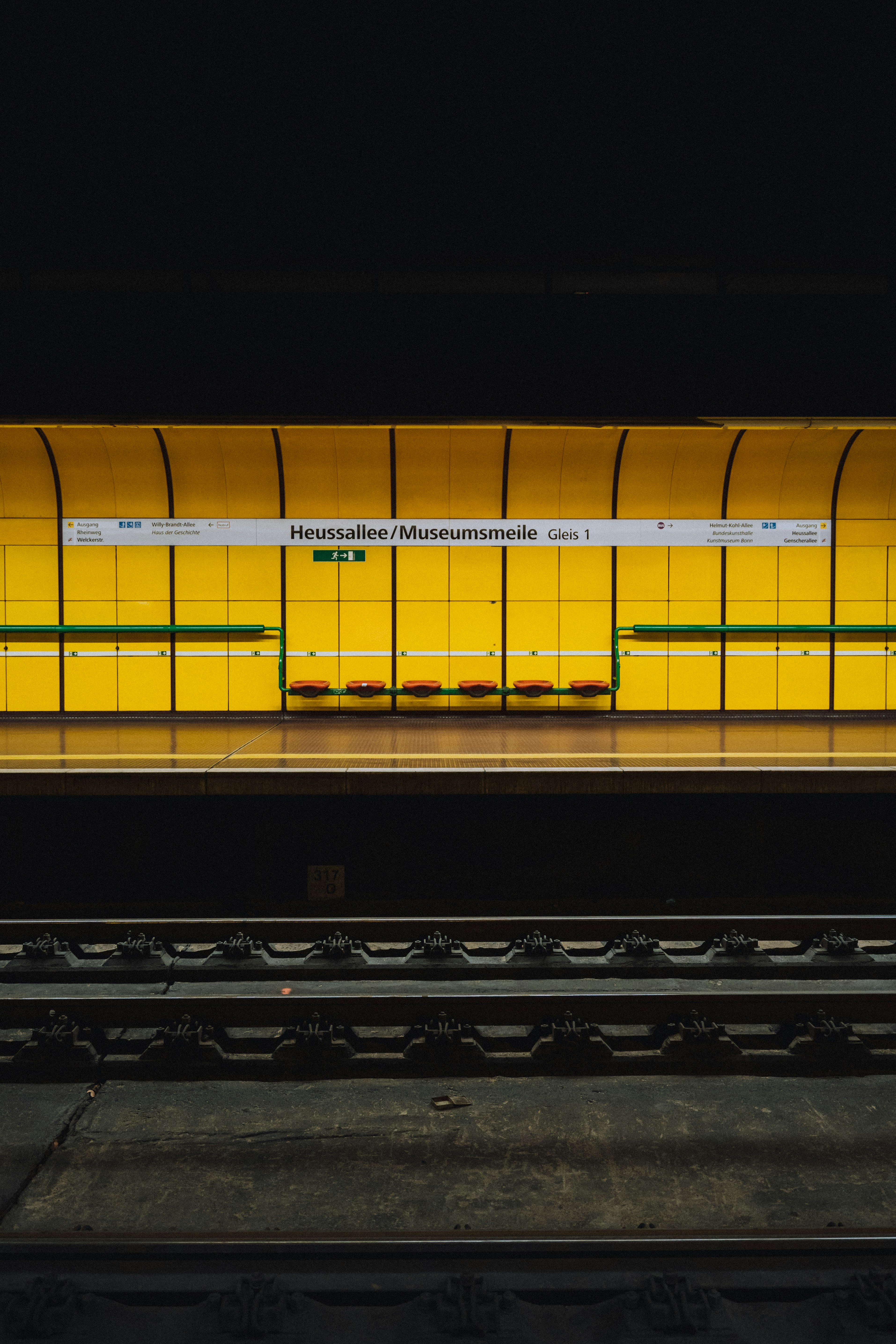 Yellow and black train on rail tracks photo – Free Train Image on Unsplash